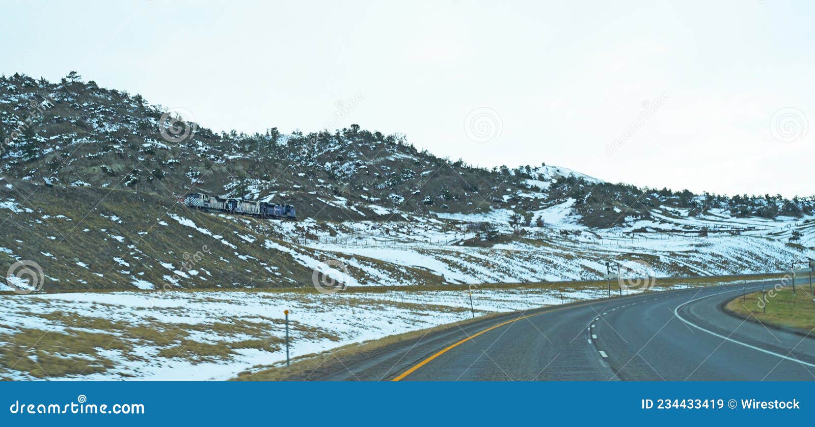 Street with a Slope Covered with Snow in the Winter Stock Image - Image ...
