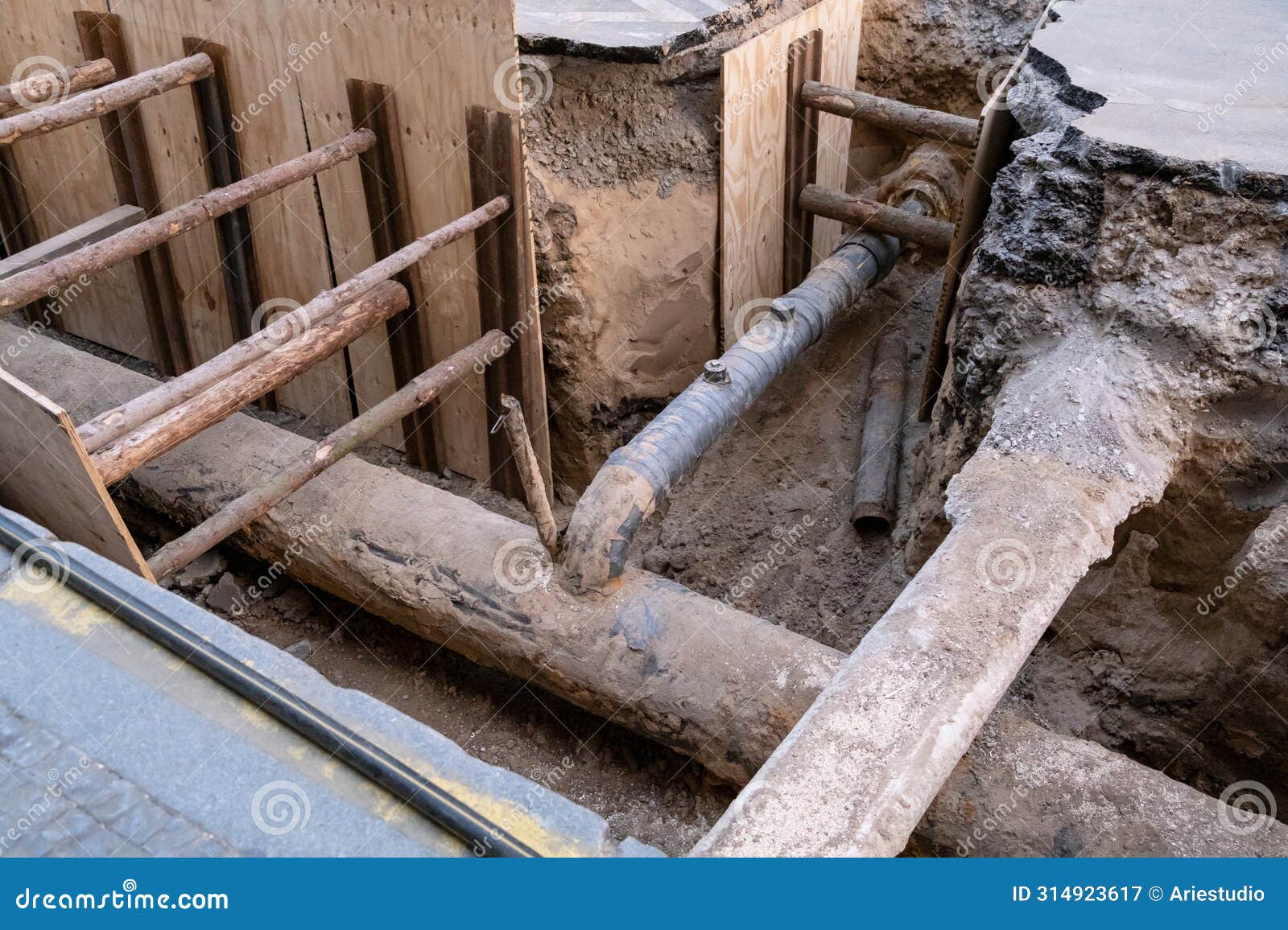 The Street Undergoes Infrastructure Maintenance, with a Replacement of ...