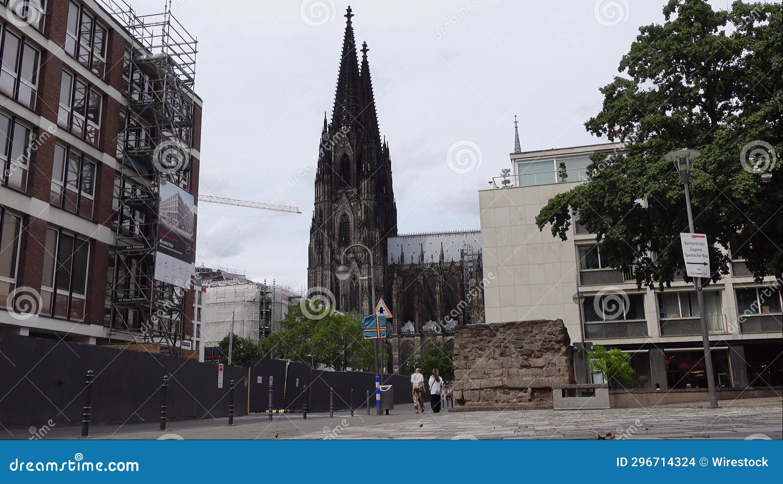 Street View of People Walking with Cologne Cathedral in the Background ...