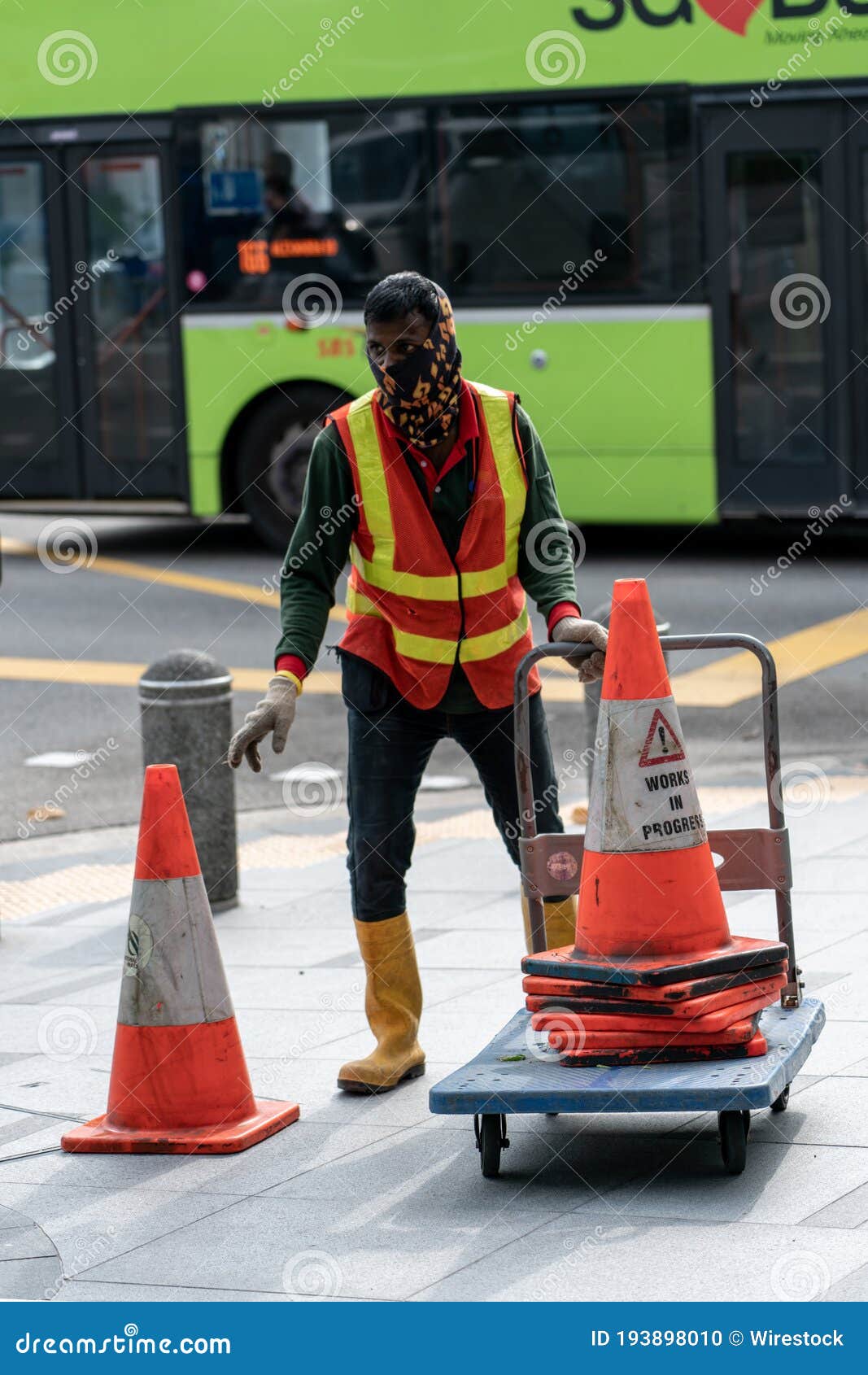 Street Worker Placing Work in Progress Signs Editorial Image - Image of ...