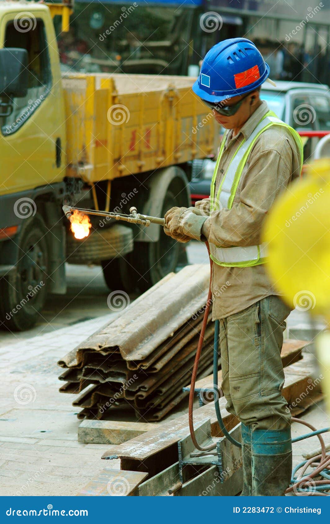 Street Worker Using Torch for Stock Photo - Image of china, torch: 2283472