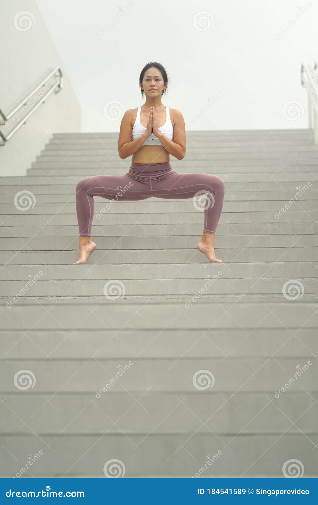 Street Yoga Asian Chinese Woman Doing Yoga In Public Spaces Stock