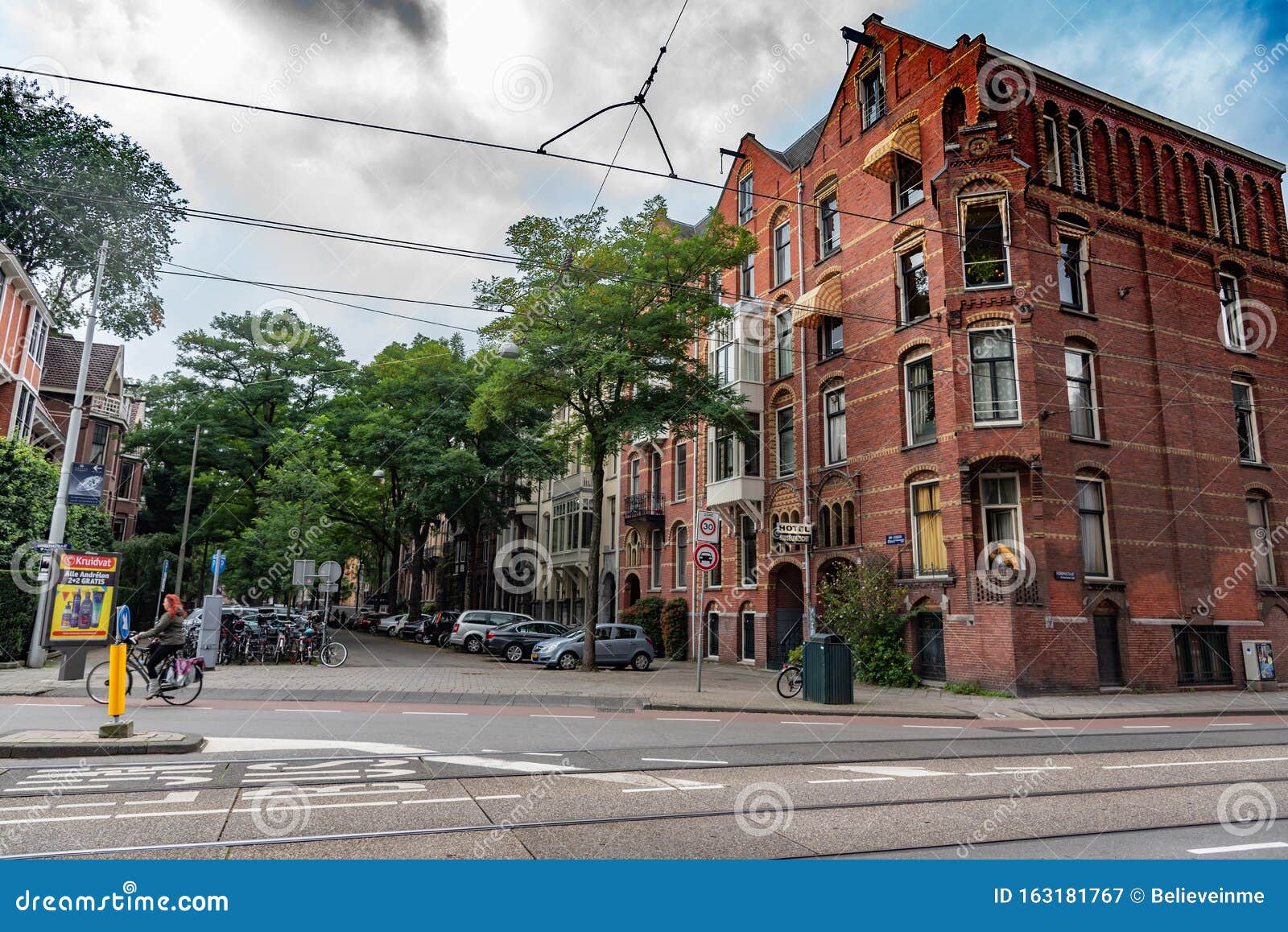 The streets of Amsterdam editorial photography. Image of intersection ...