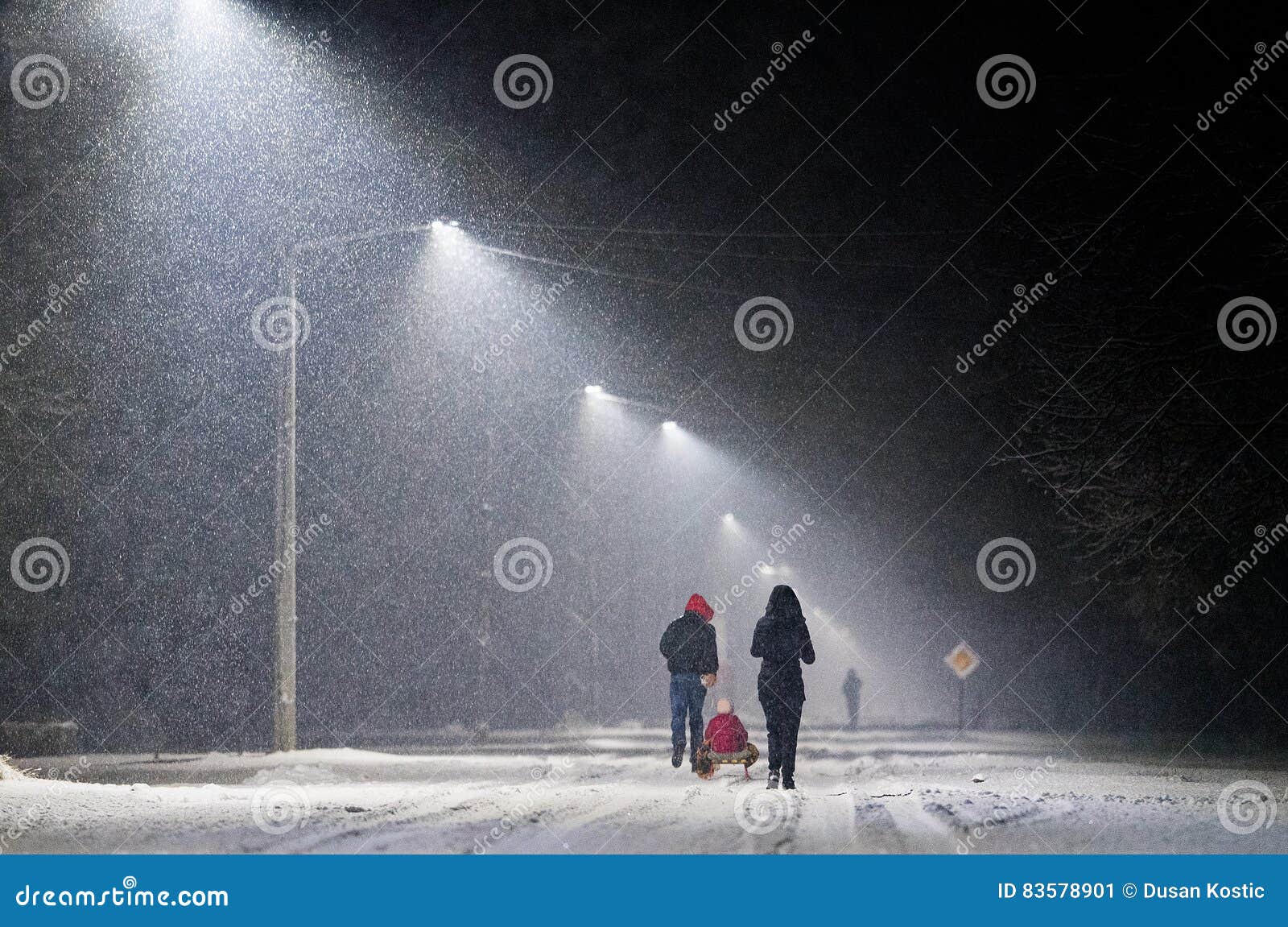 Streets in snowy evening stock image. Image of diminishing - 83578901