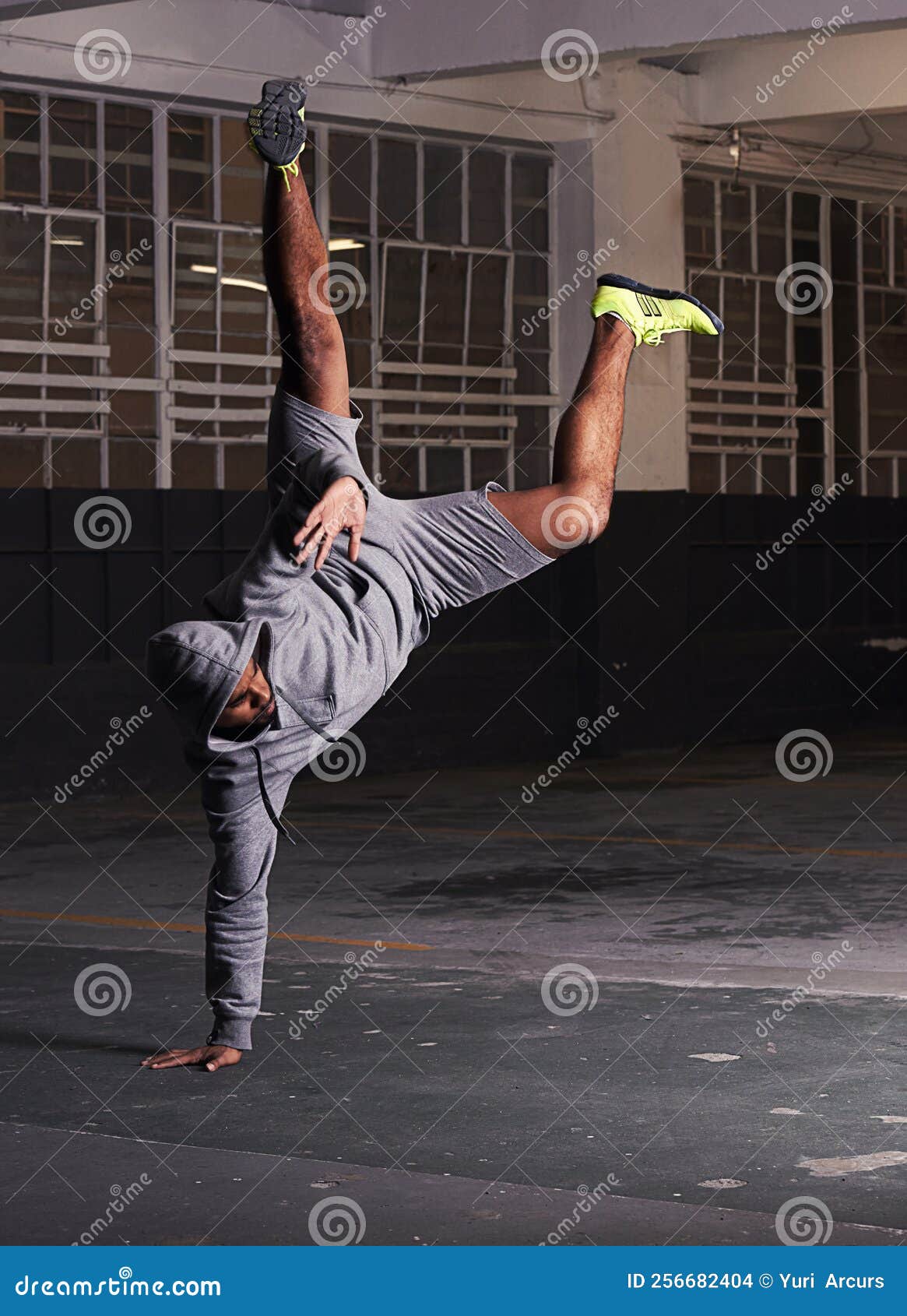 Strength and Form. a Full Length Shot of a Young Man Breakdancing ...