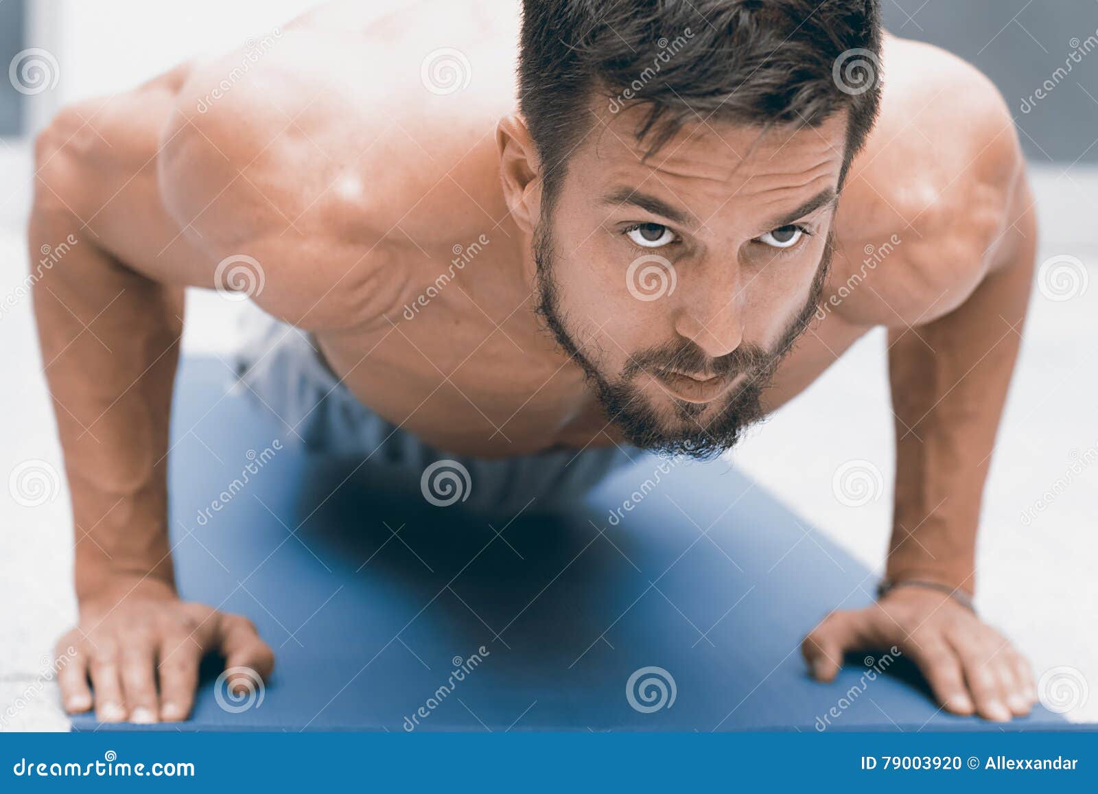 Strength and Motivation. Young Handsome Man Doing Push-up at Gym Stock ...
