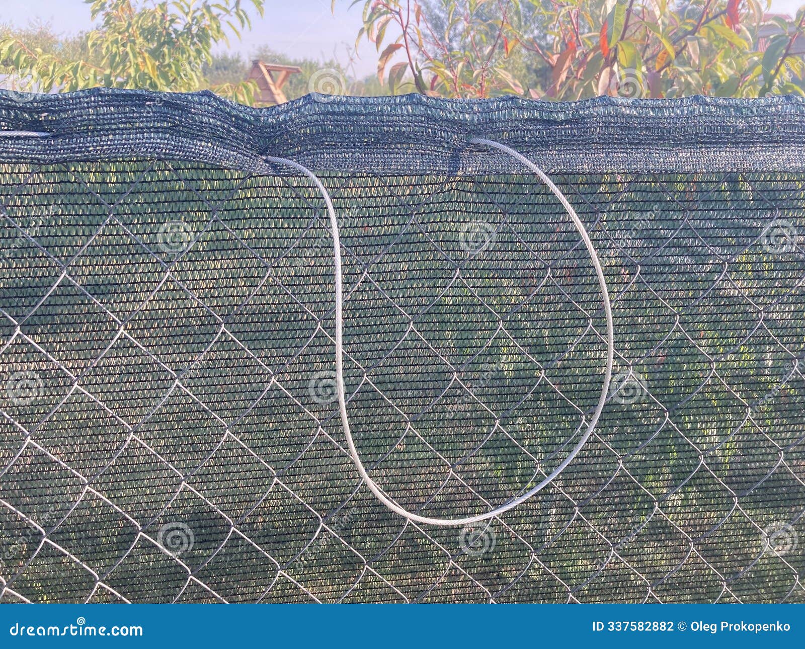 Strengthening the Fence with a Rope and Wire Stock Photo - Image of ...