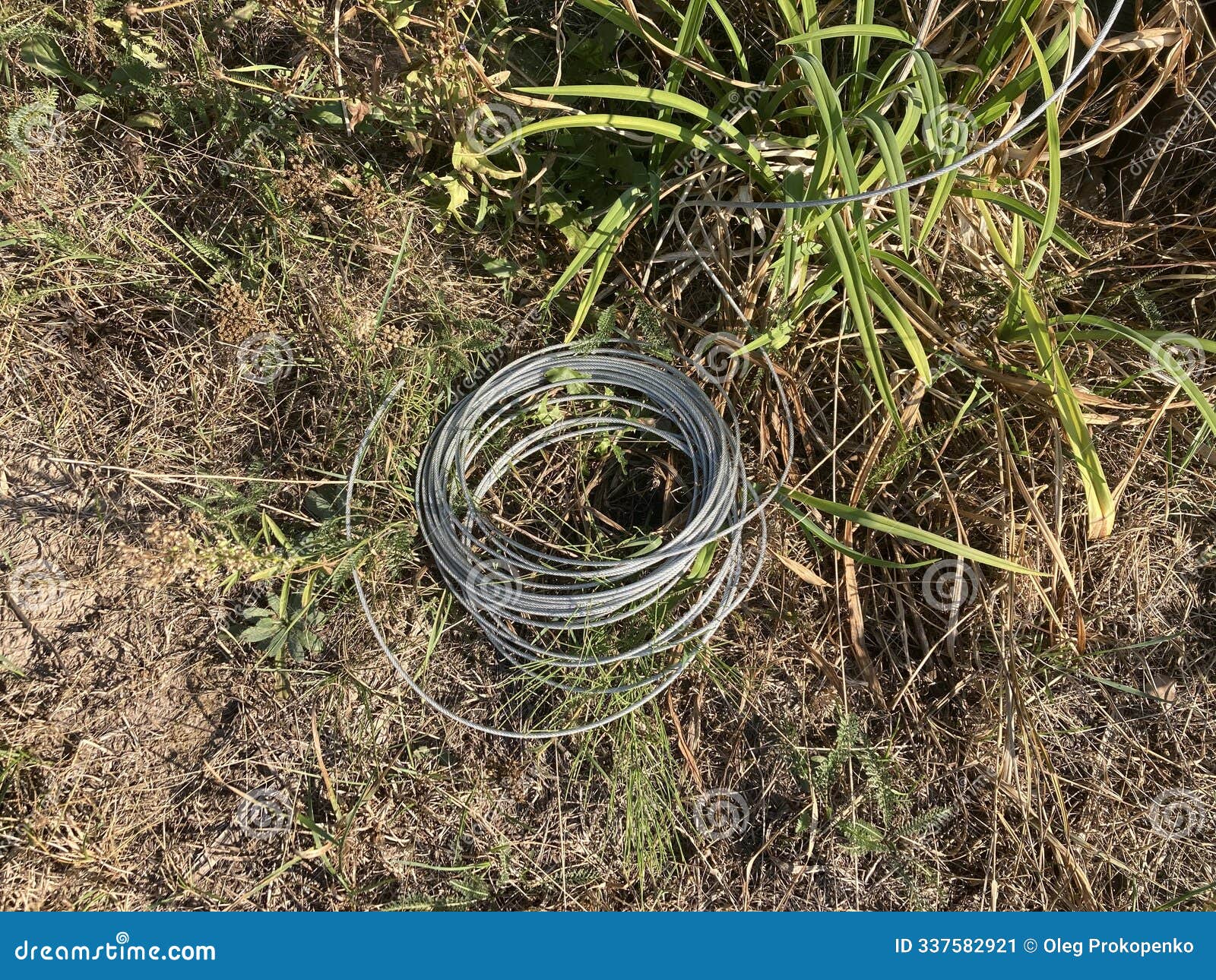 Strengthening the Fence with a Rope and Wire Stock Image - Image of ...