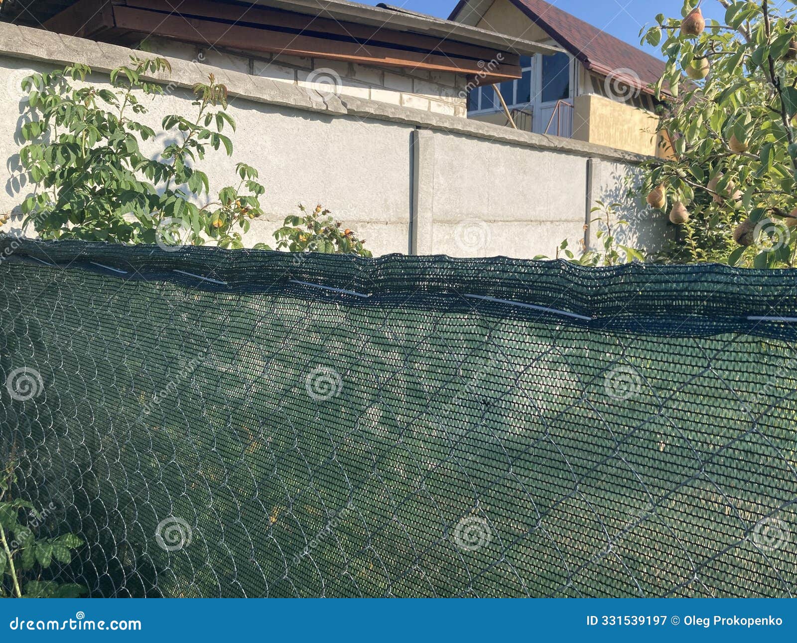 Strengthening a Fence with a Shading Net with a Rope Stock Image ...