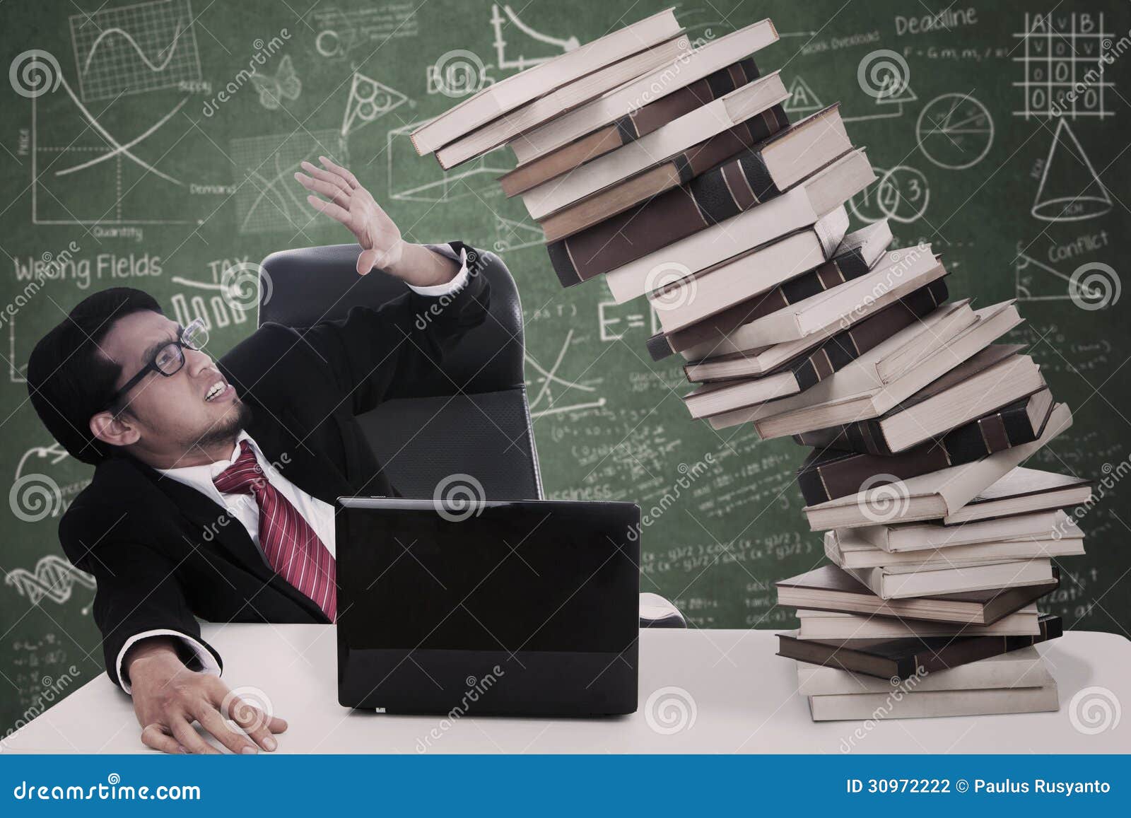 Stress Businessman with Falling Books at Class Stock Photo - Image of ...