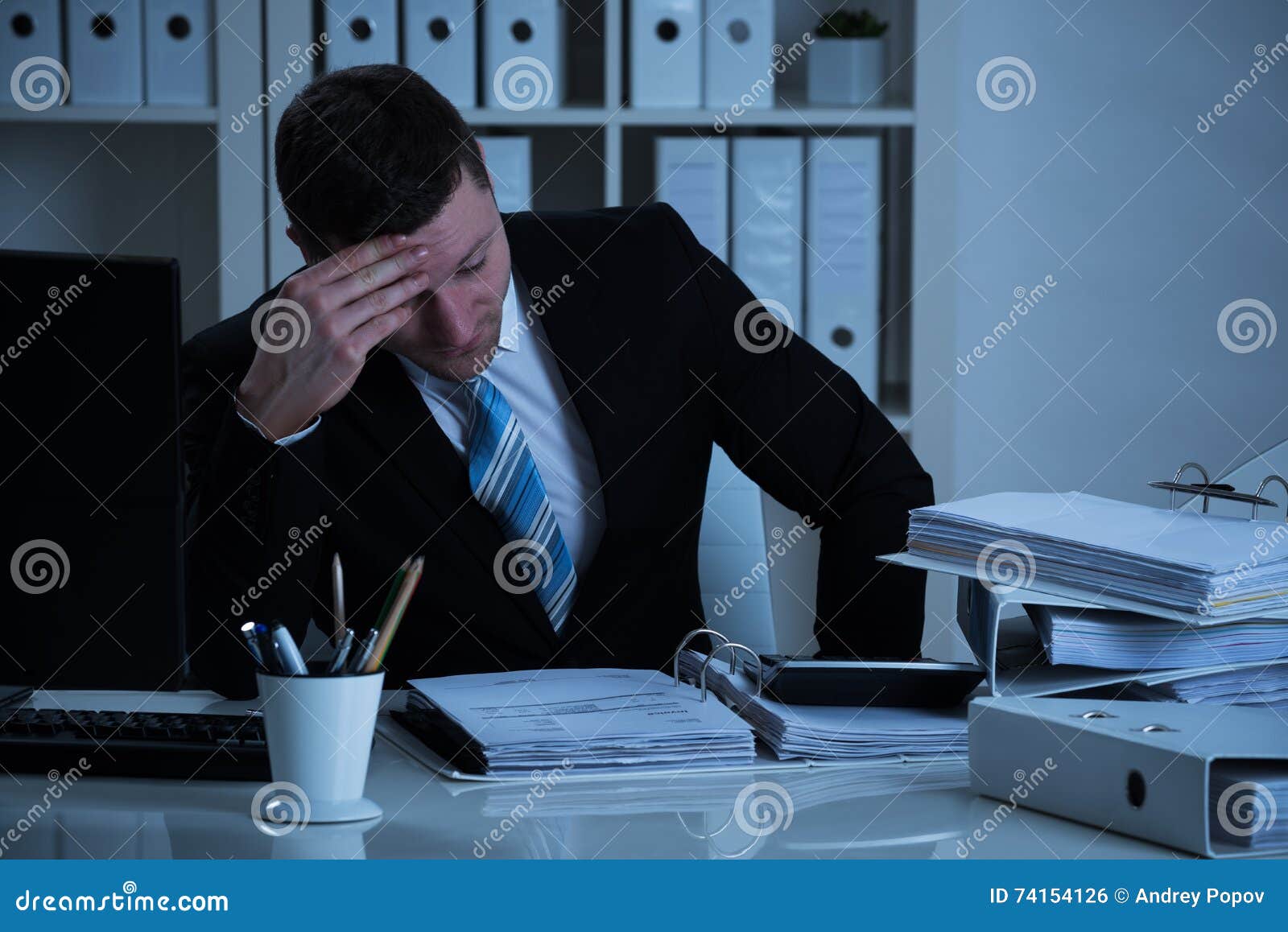 Stressed Accountant Working Late in Office Stock Photo - Image of ...