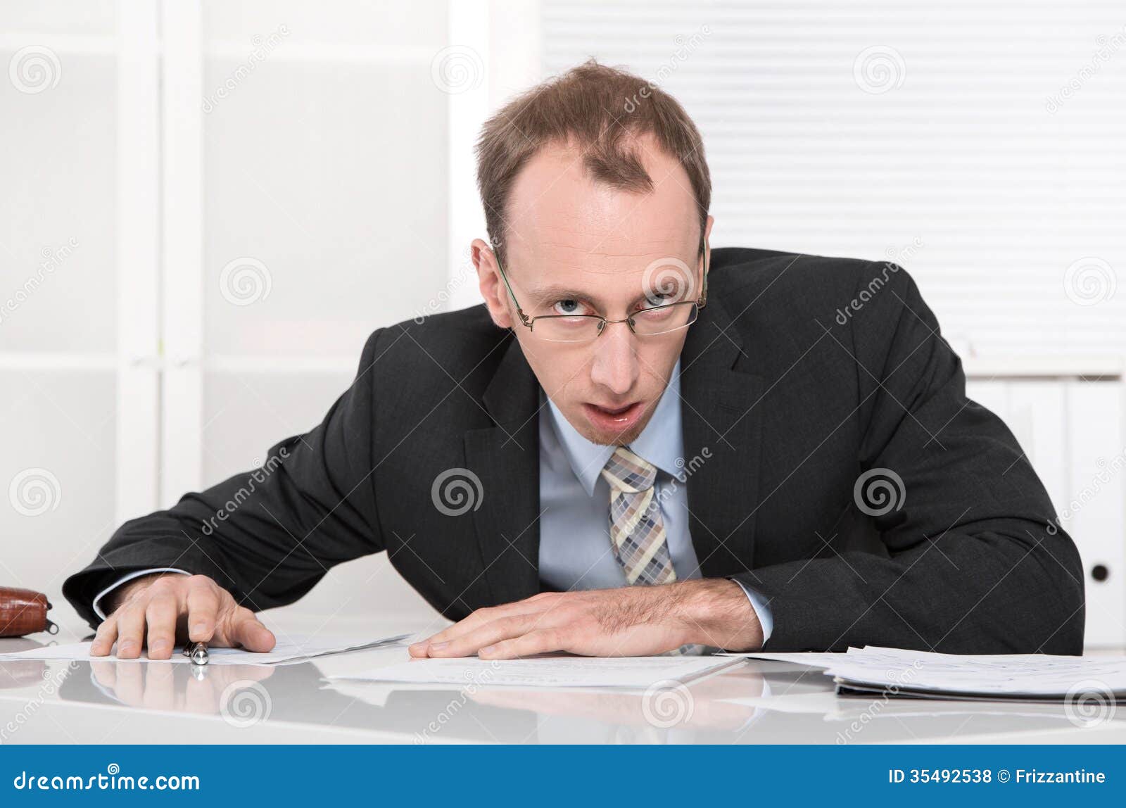 Stressed and Angry Businessman at Desk. Stock Photo - Image of banker ...
