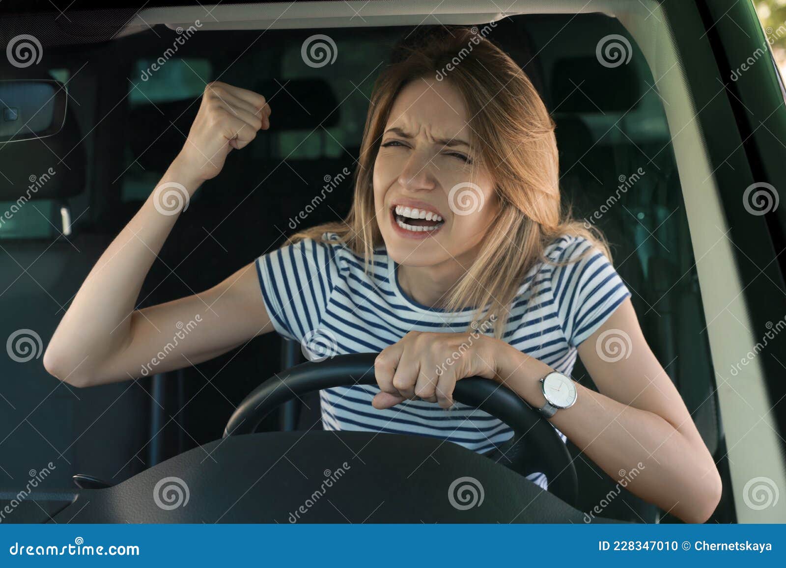Stressed Angry Woman in Driver`s Seat of Modern Car, View through ...