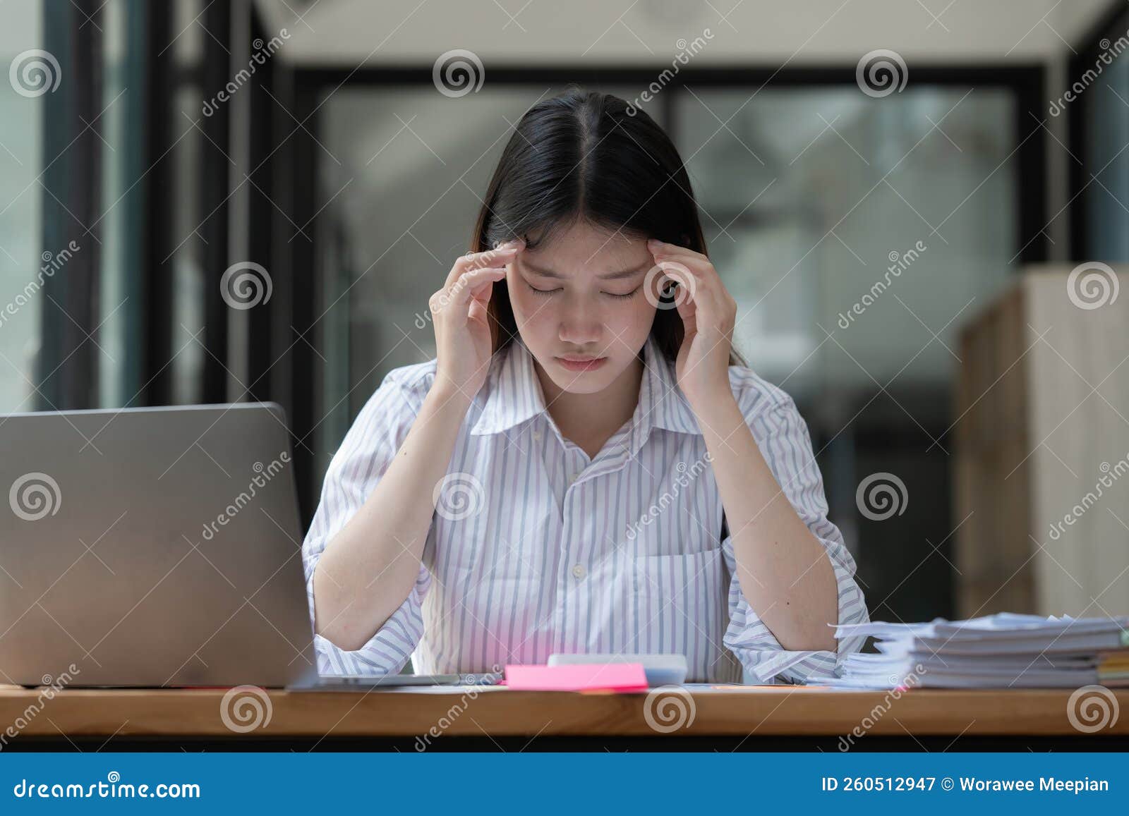 Stressed Asian Business Woman Worry with Many Document on Desk at ... Stressed Asian Business Woman Worry with Many Document on Desk at ...