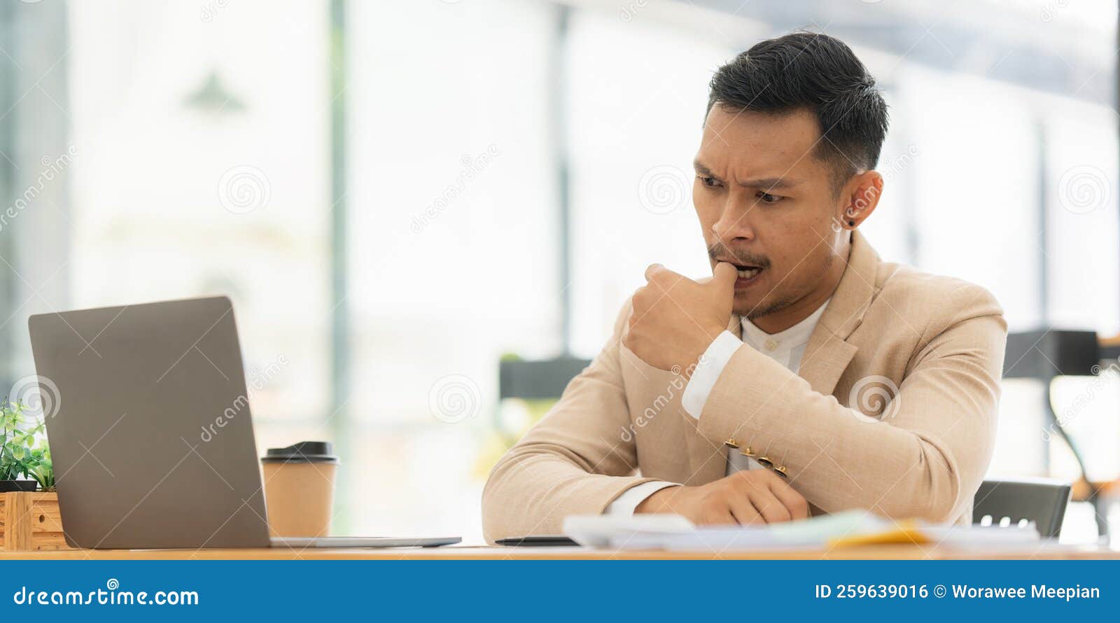 Stressed Asian Businessman Worry with Many Document on Desk at Office ... Stressed Asian Businessman Worry with Many Document on Desk at Office ...