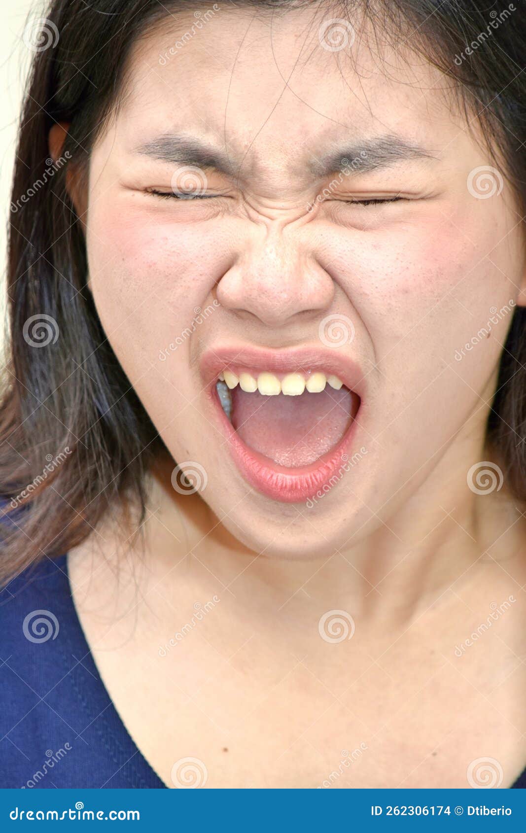 A Stressed Asian Person stock photo. Image of stressed - 262306174