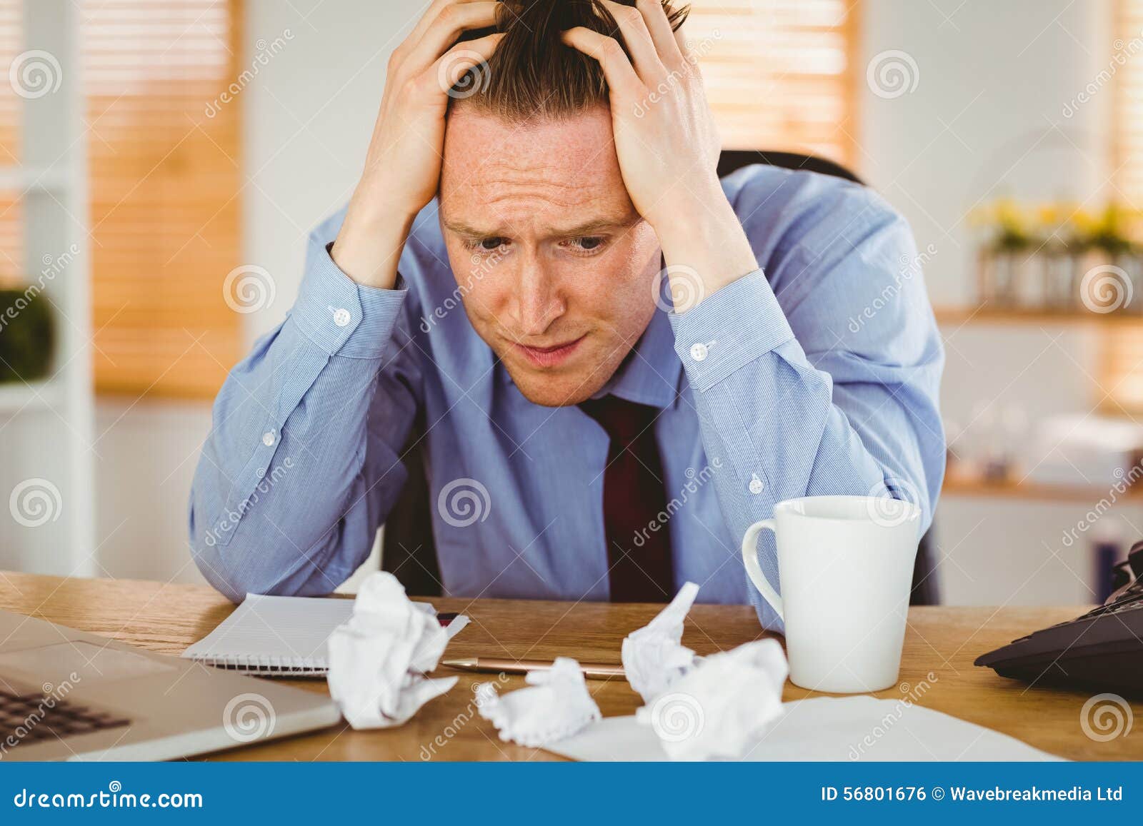Stressed Businessman with Head in Hands Stock Photo - Image of notebook ...