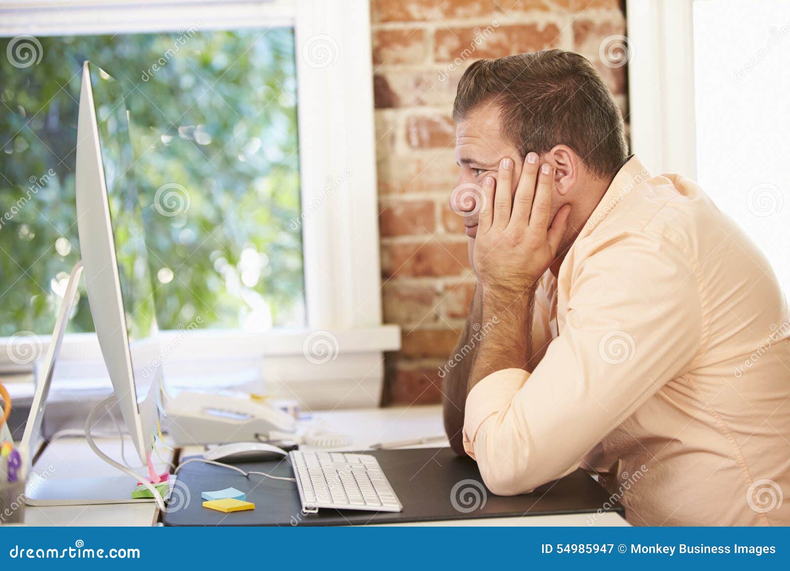 Stressed Businessman Working at Computer in Modern Office Stock Image ...
