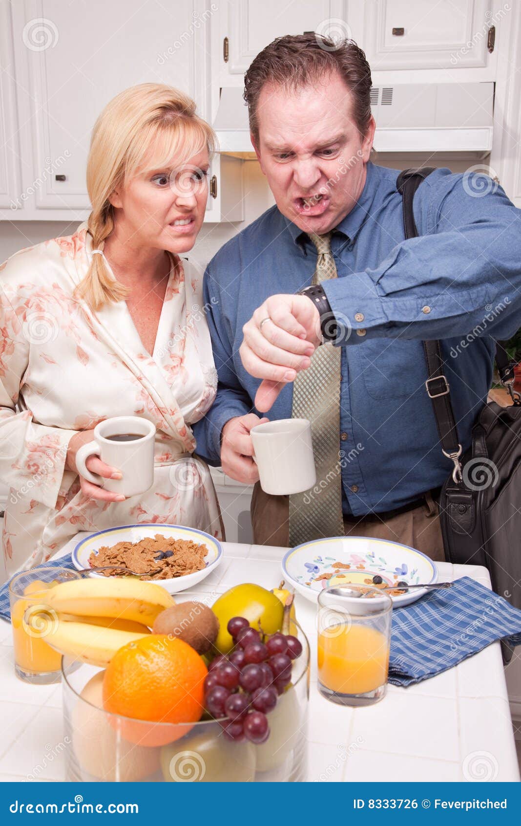 Stressed Couple in Kitchen Late for Work Stock Photo - Image of house ...