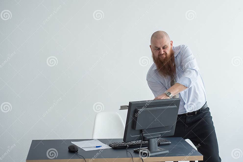 Stressed Crazy Businessman Smashing His Computer in Office Using Ax ...