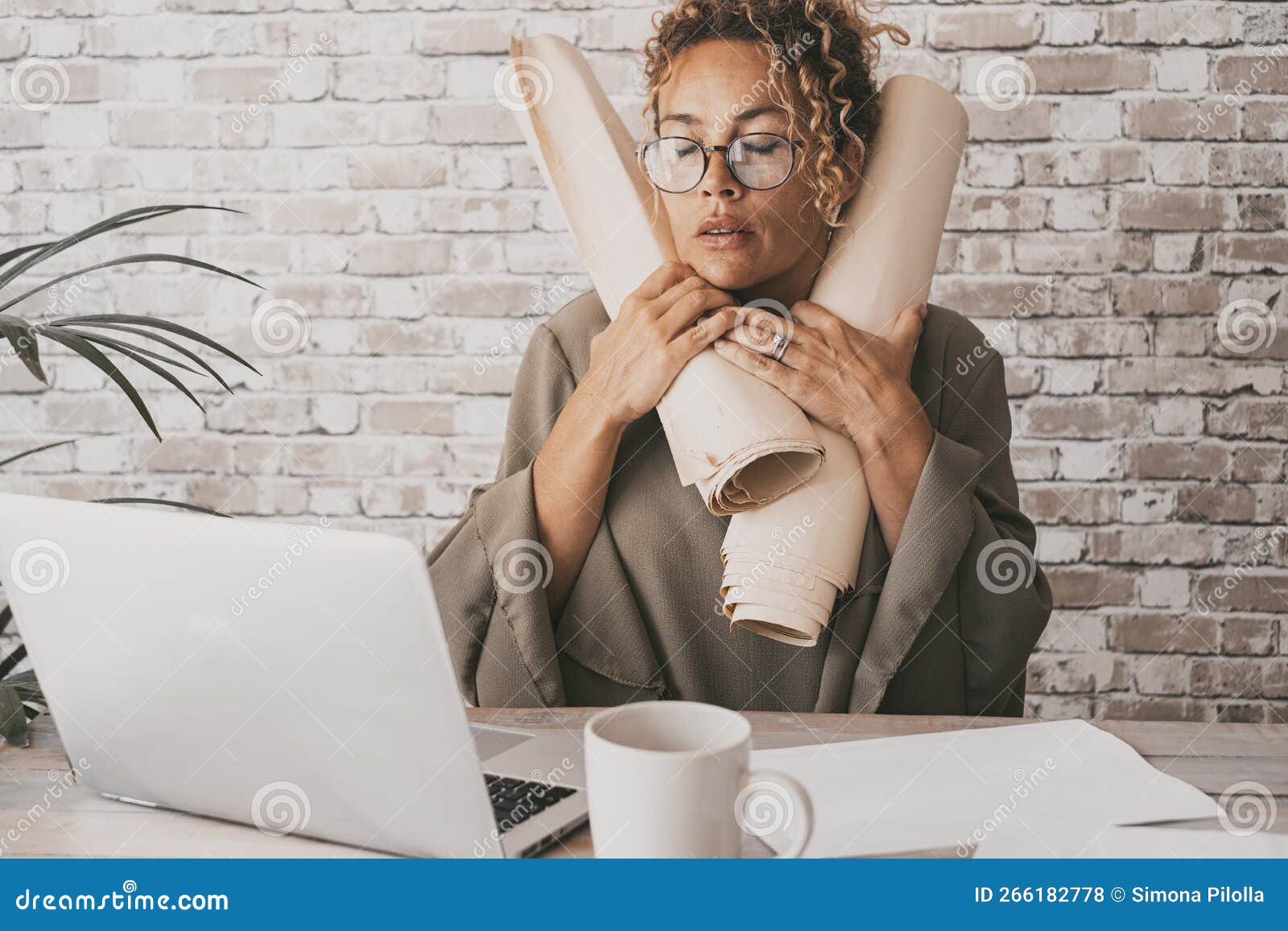 Stressed Designer at Work in Office Workplace Workshop Holding Papers ...