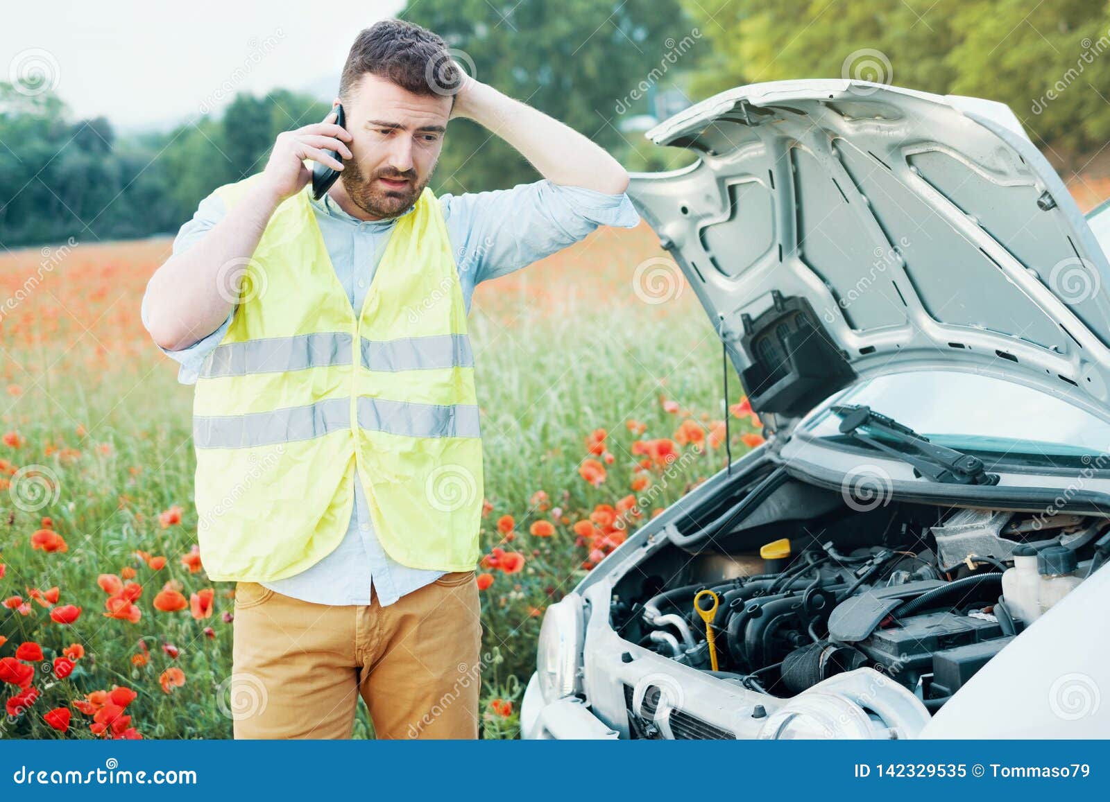 Stressed Driver after Car Breakdown Calling Roadside Service Stock ...