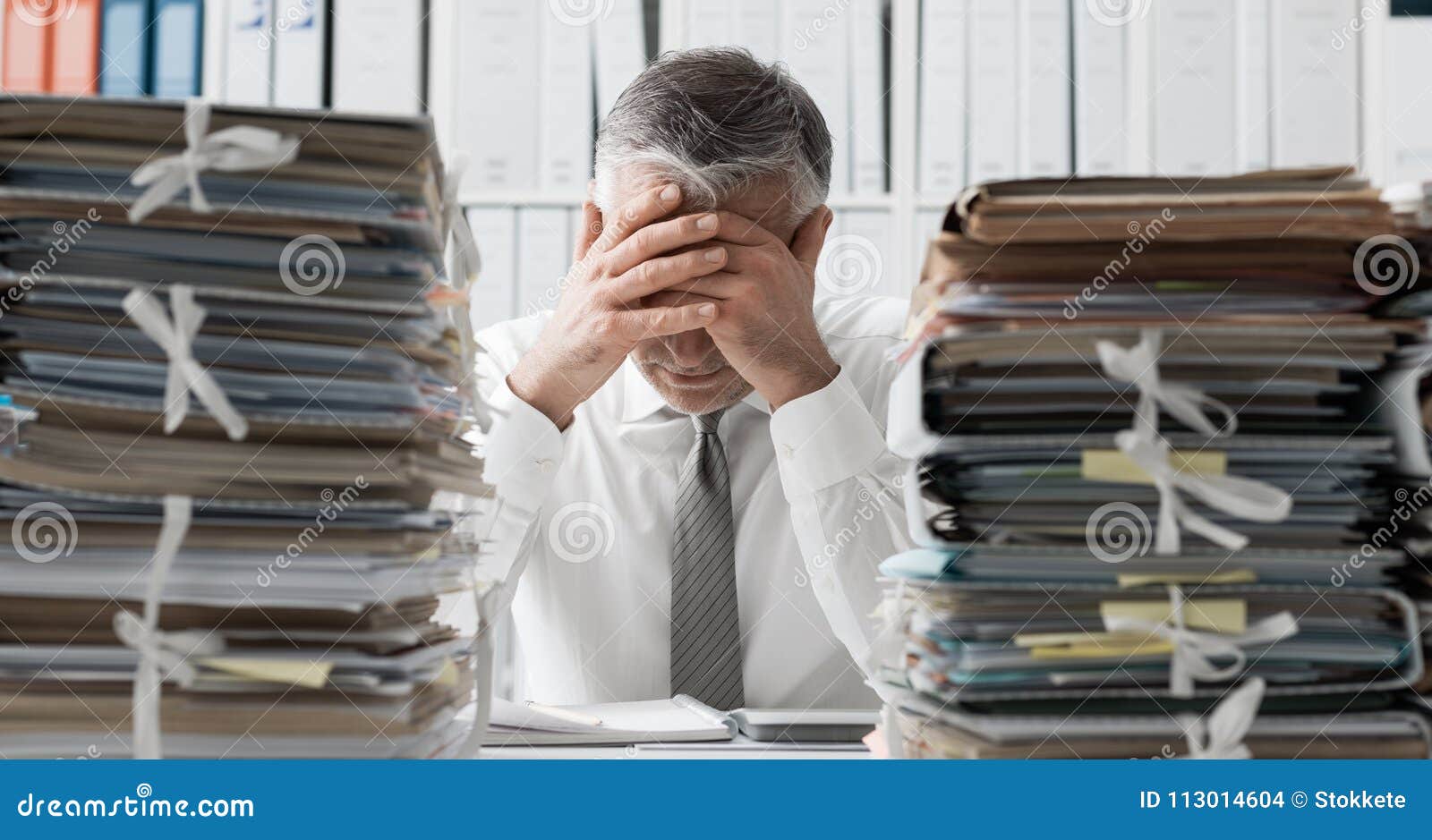 Stressed Business Executive and Piles of Paperwork Stock Photo - Image ... Stressed Business Executive and Piles of Paperwork Stock Photo - Image ...