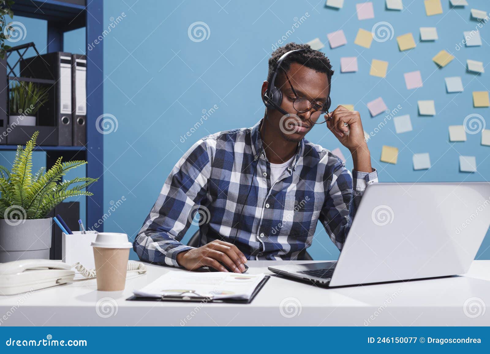 Stressed and Fatigued Telemarketer Representative Wearing Headset while ...