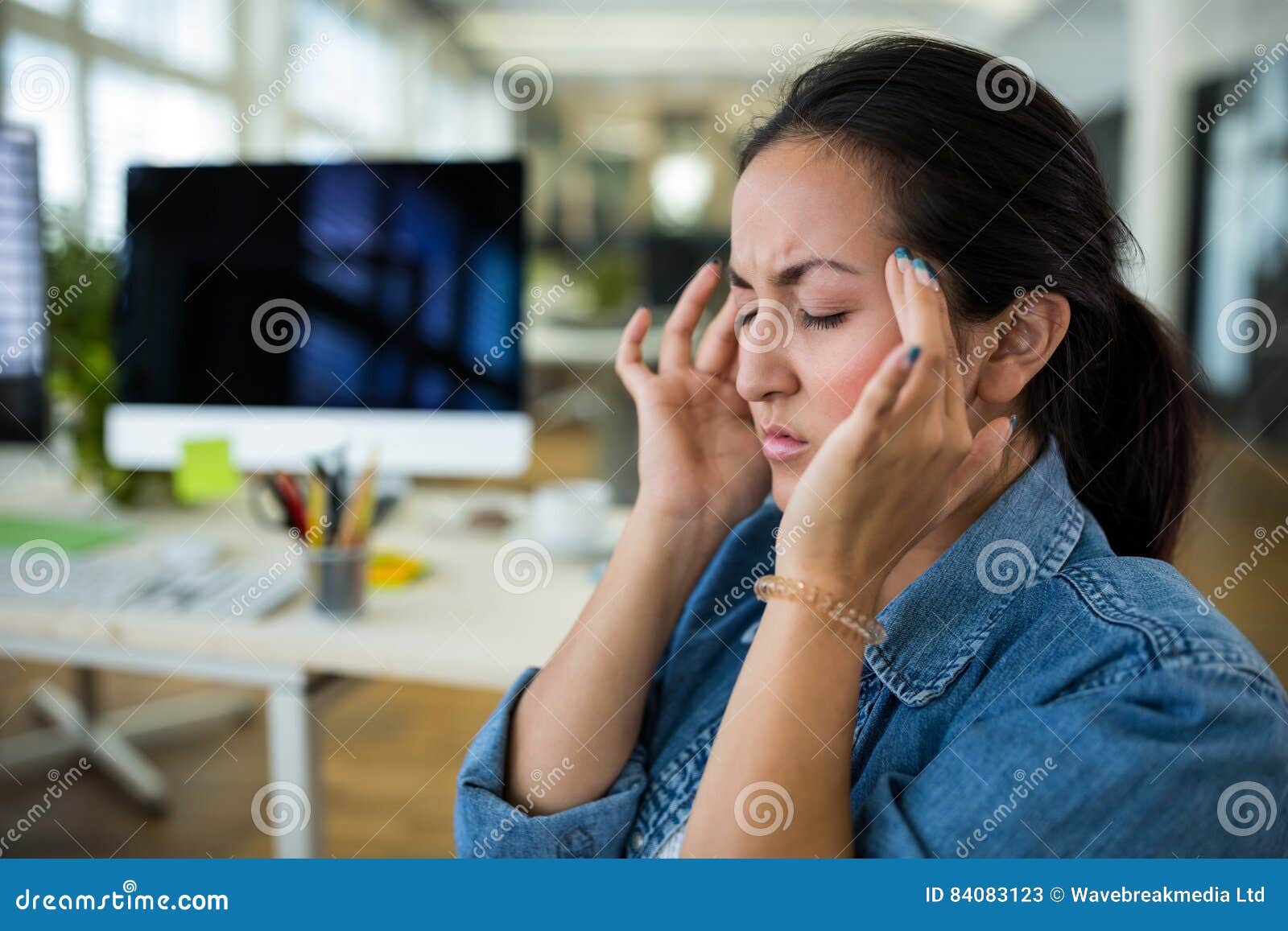 Stressed Female Business Executive at Desk Stock Image - Image of ...