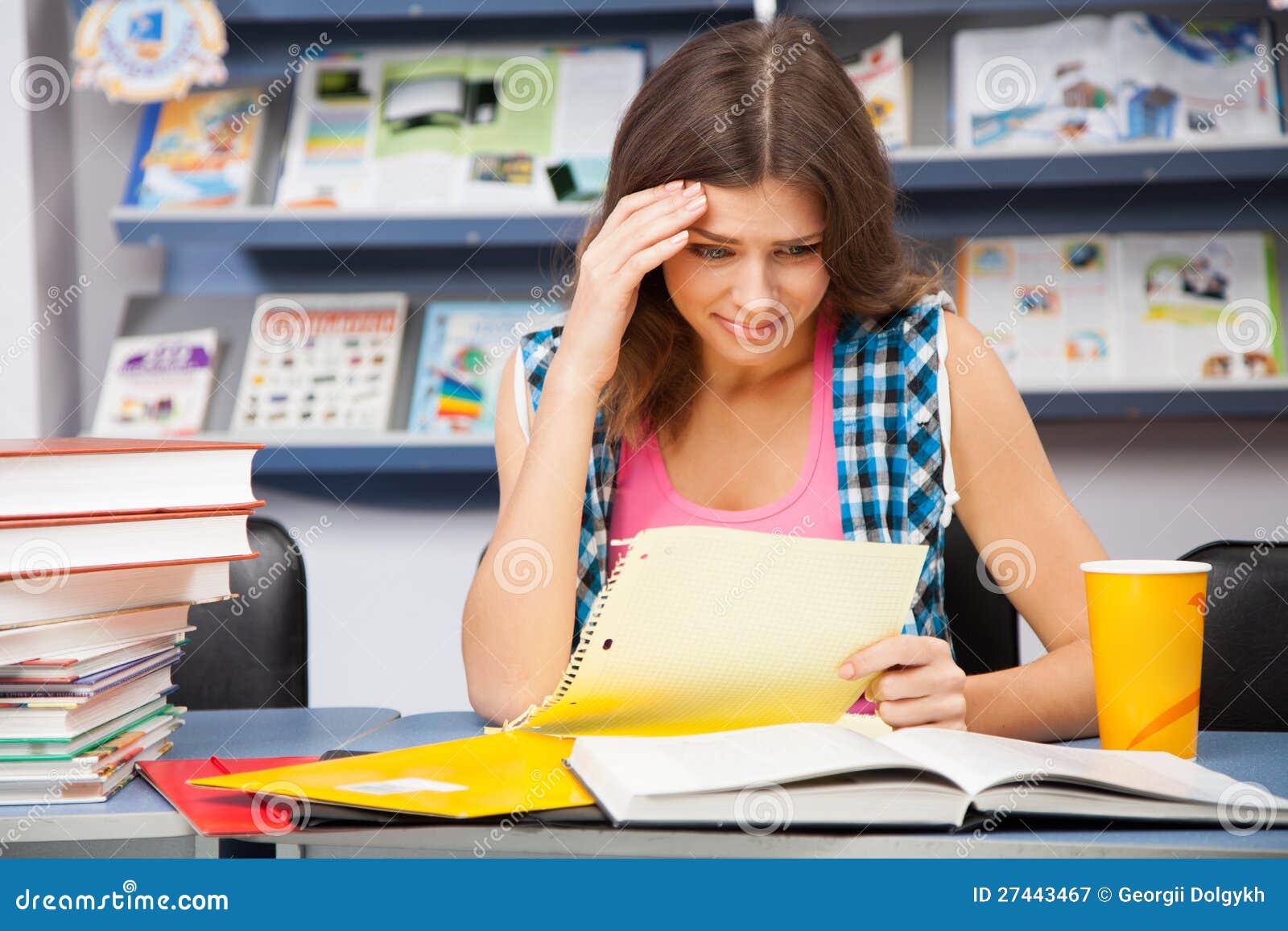 Stressed Female Student in a Library Stock Image - Image of hand ...