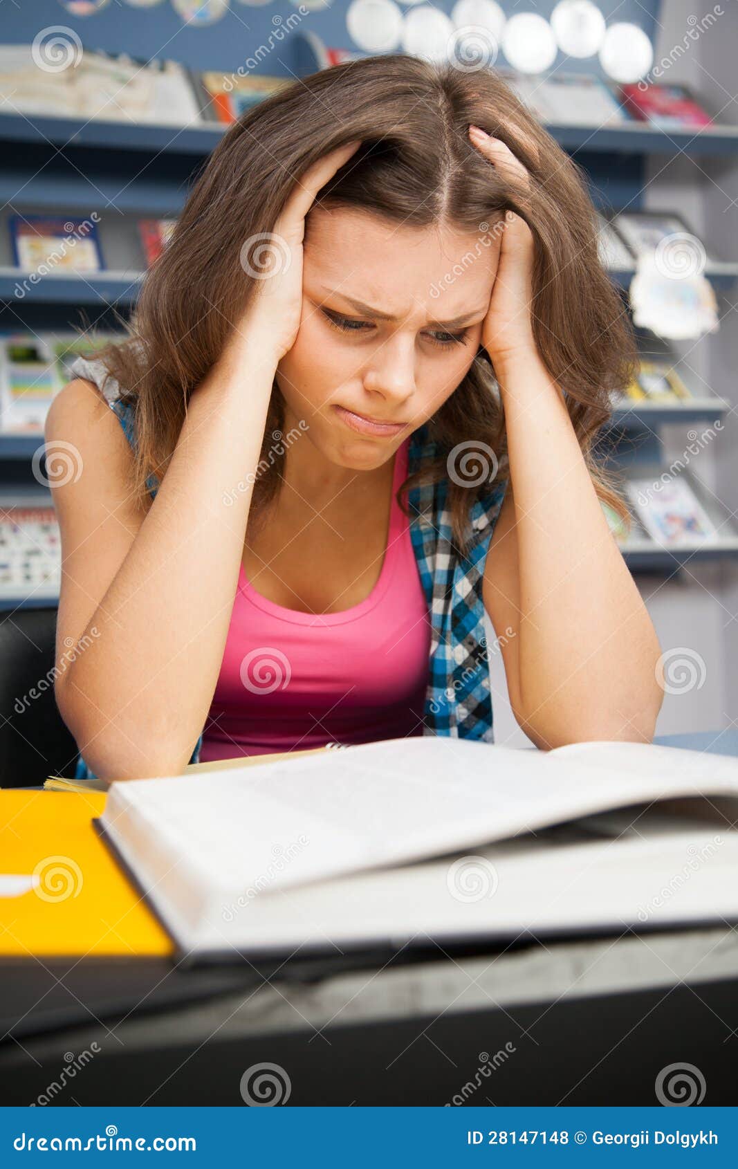 Stressed Female Student in a Library Stock Photo - Image of girl ...