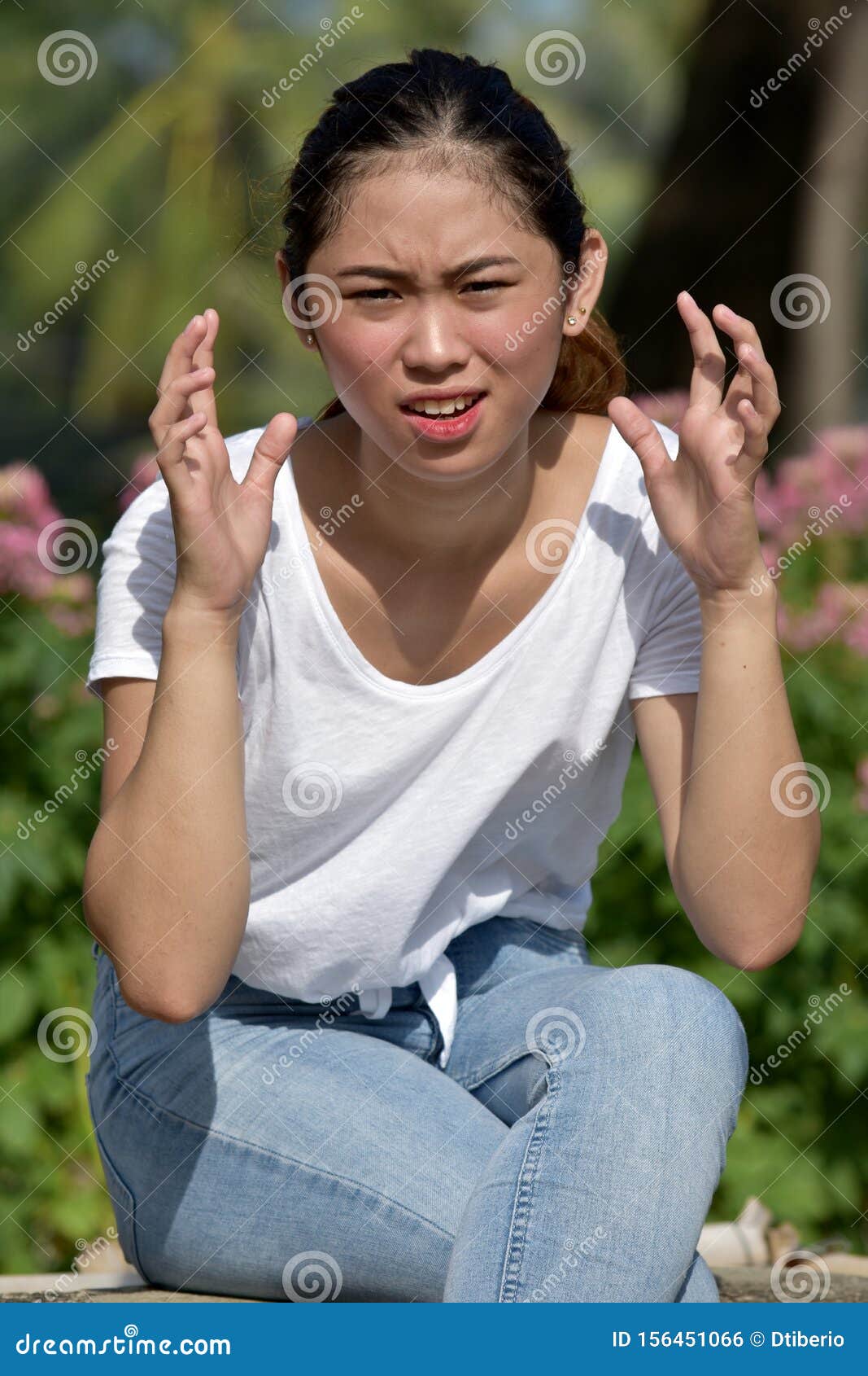 A Stressed Filipina Person stock photo. Image of nervous - 156451066