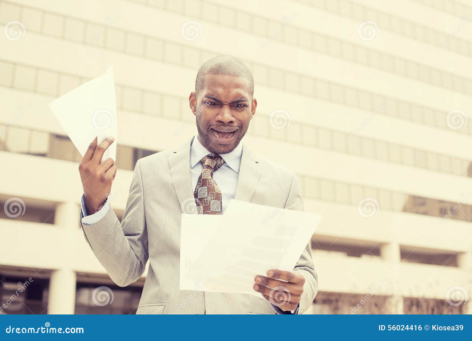 Stressed Frustrated Man Holding Looking at Documents Stock Photo ...