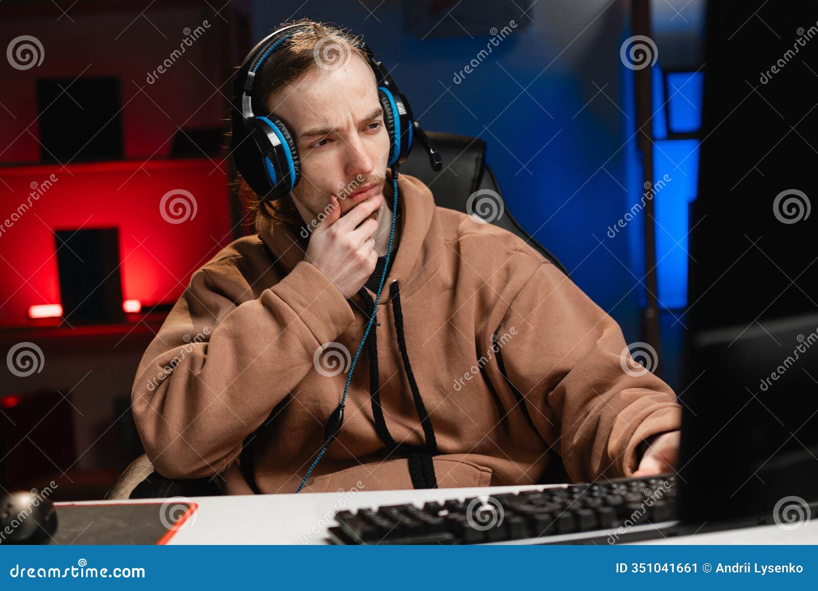 Stressed Gamer Playing Computer Games Sitting in the Living Room at ...