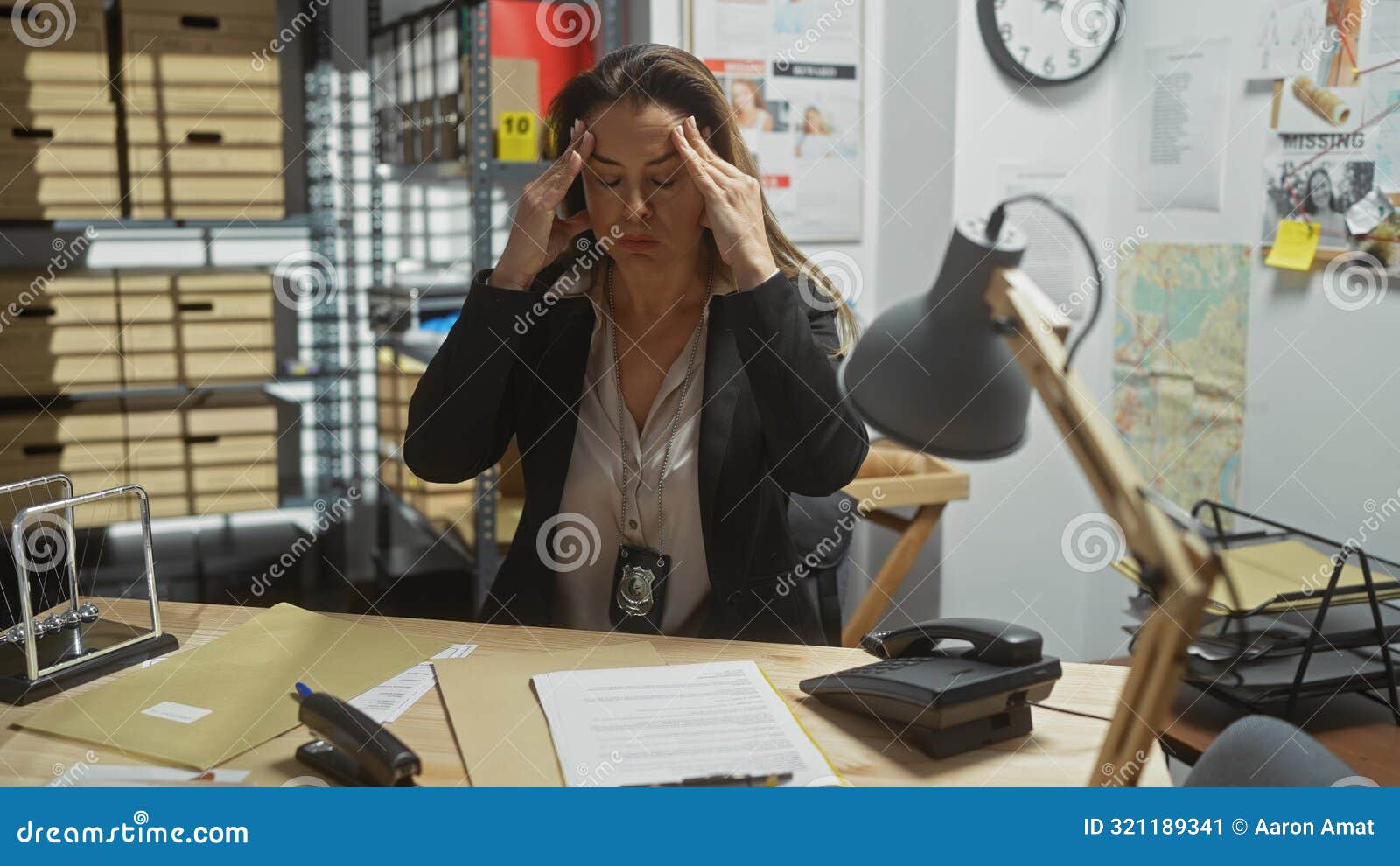 Stressed Hispanic Woman Detective at Office with Evidence Board Stock ...