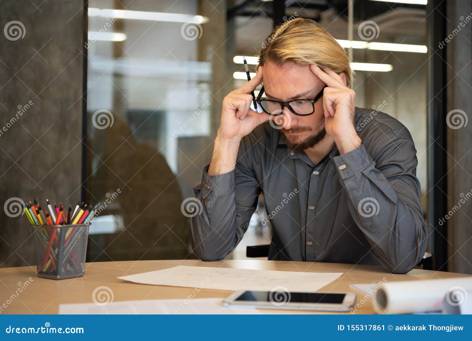 Stressed Male Creative Designer Sitting and Thinking Stock Image ...