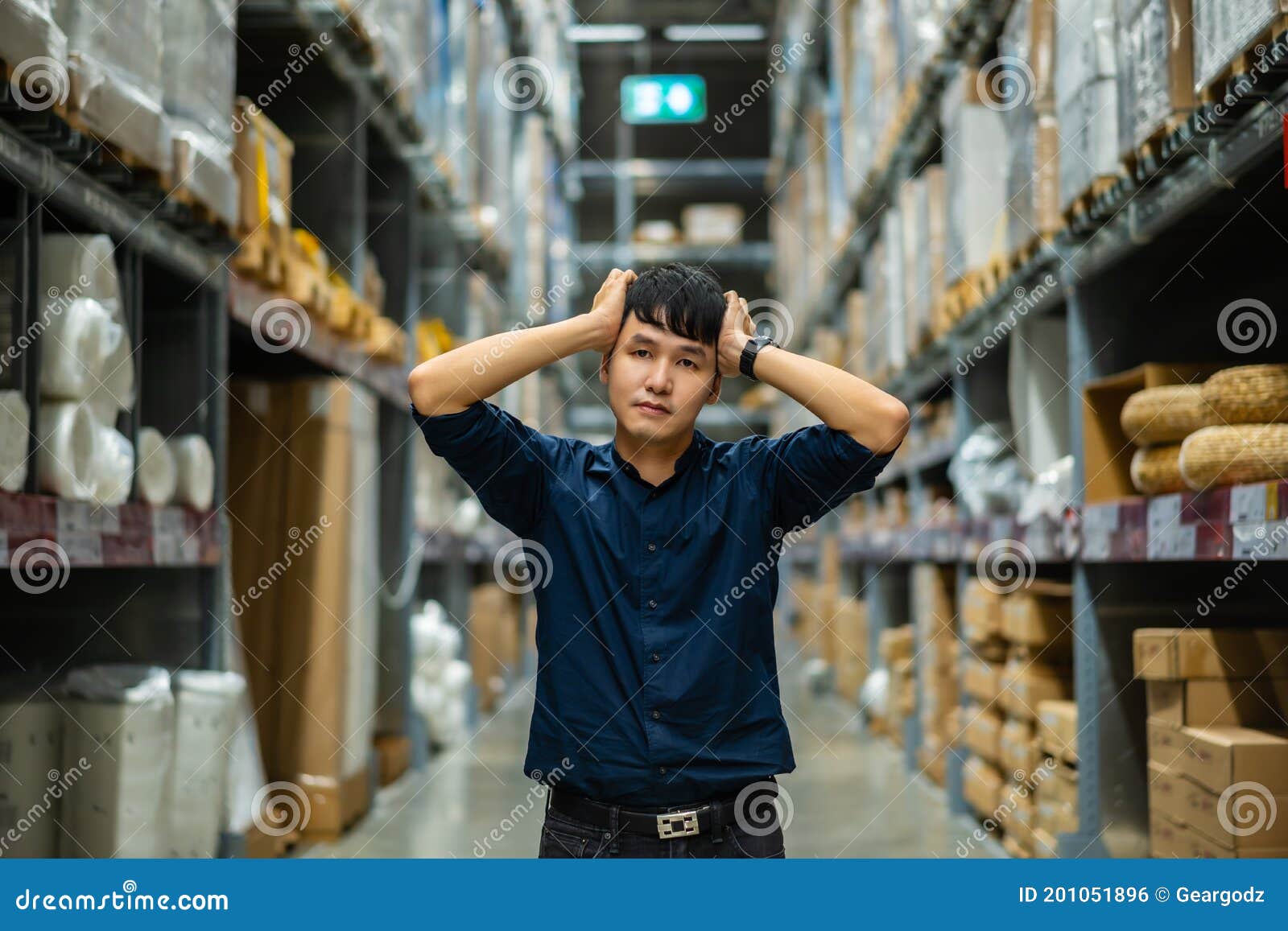 Stressed Male Manager in Warehouse Store Stock Photo - Image of asian ...