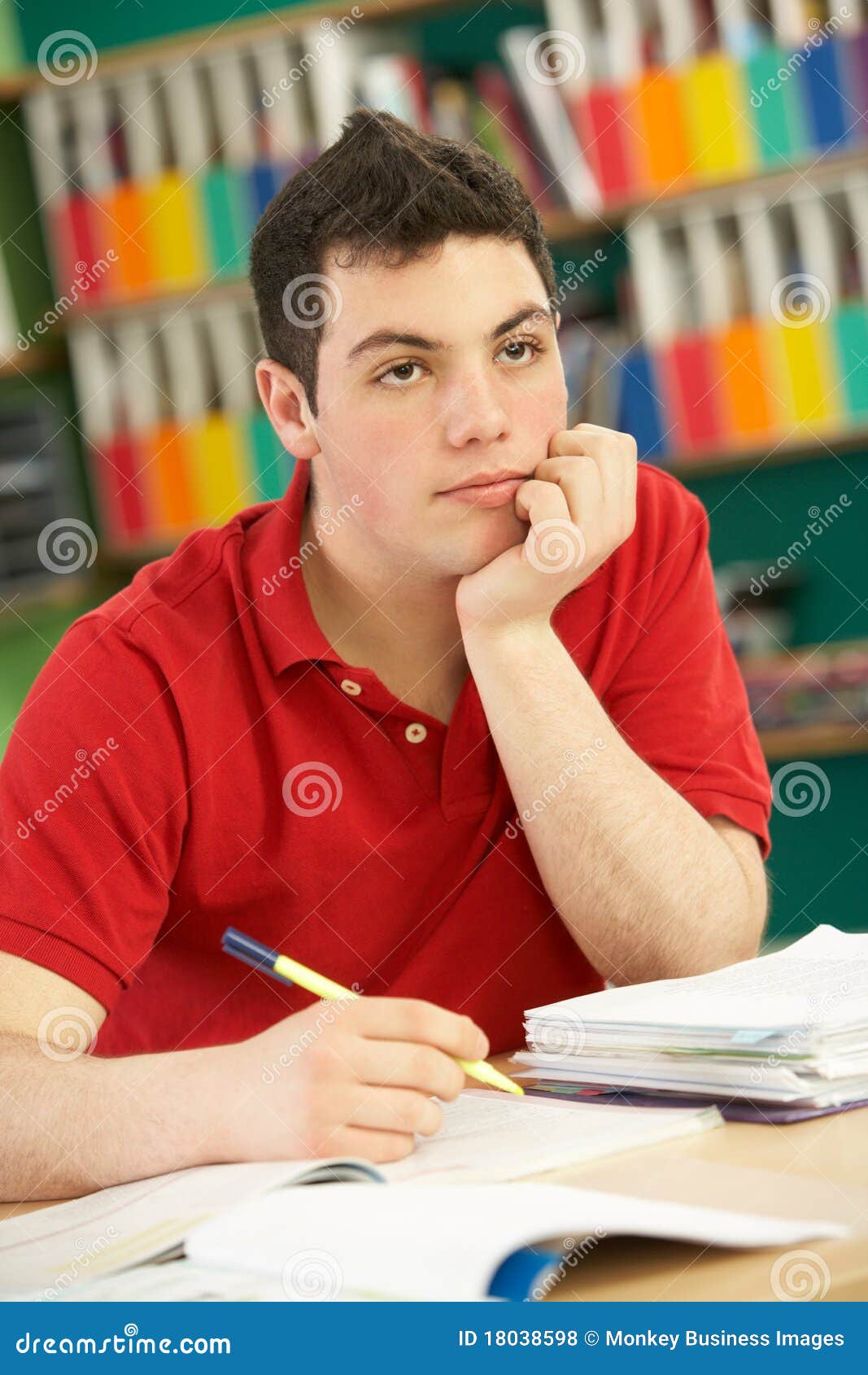 Stressed Male Teenage Student Studying Stock Photo - Image of person ...