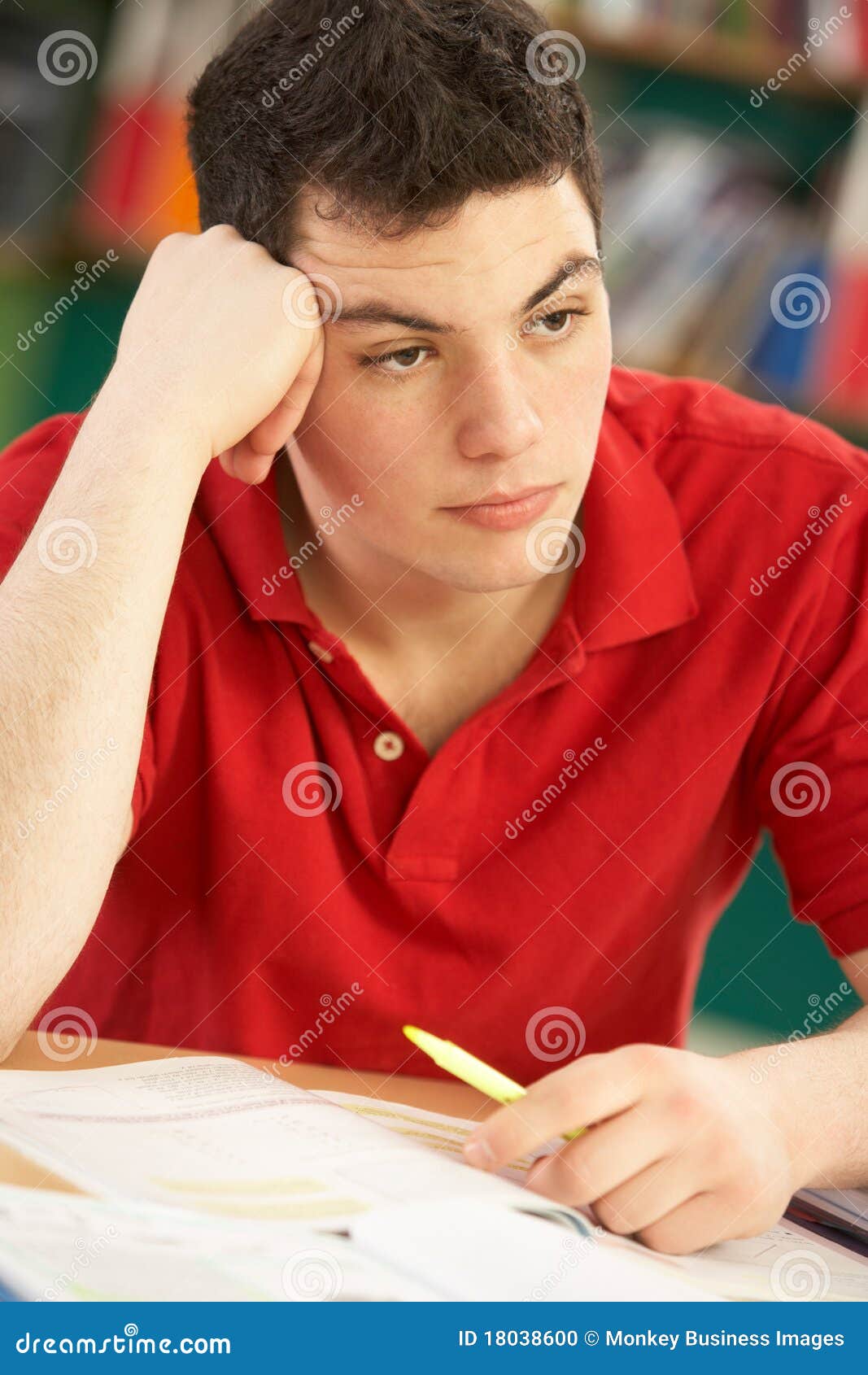 Stressed Male Teenage Student Studying Stock Photo - Image of listening ...