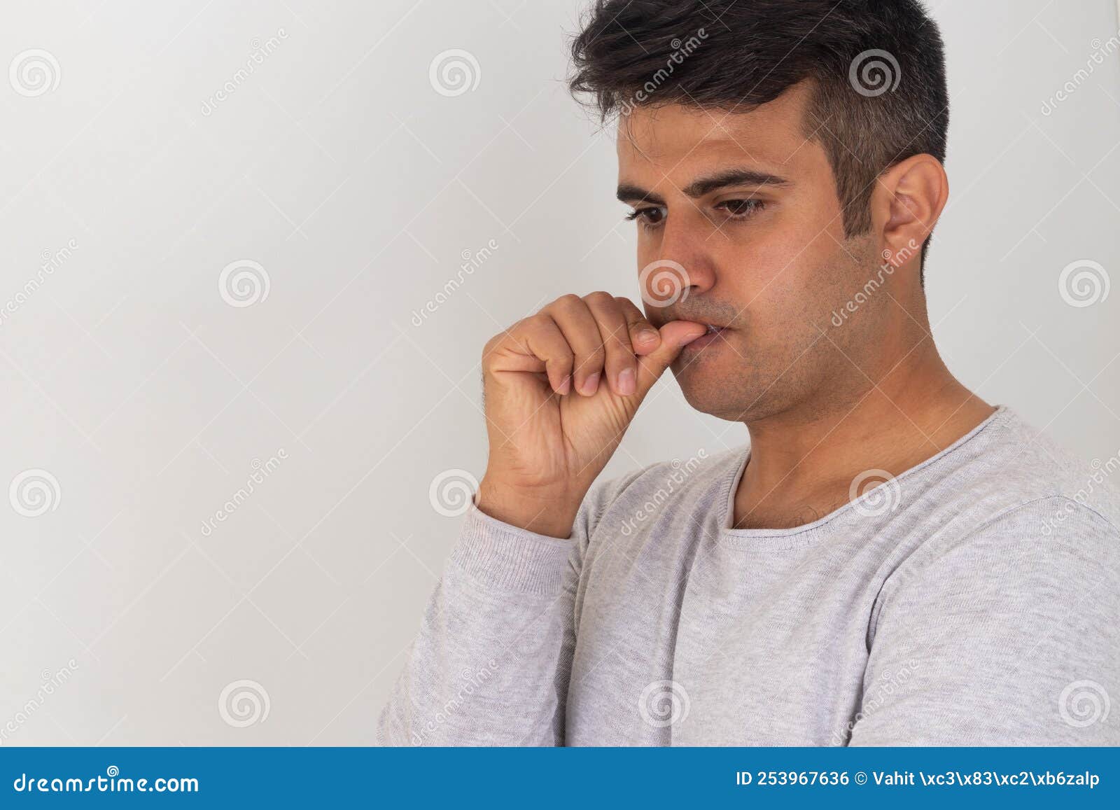 Stressed Man Biting Finger Nails on Isolaned Background Stock Photo ...