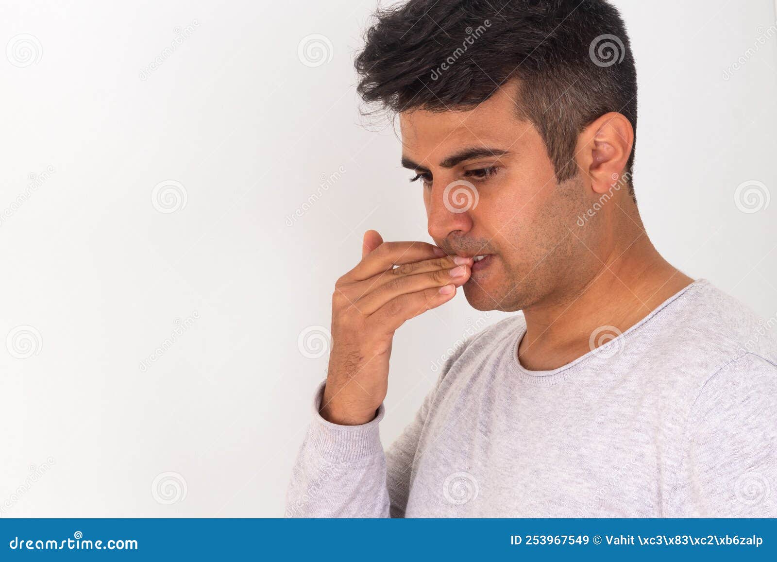 Stressed Man Biting Finger Nails on Isolaned Background Stock Image ...