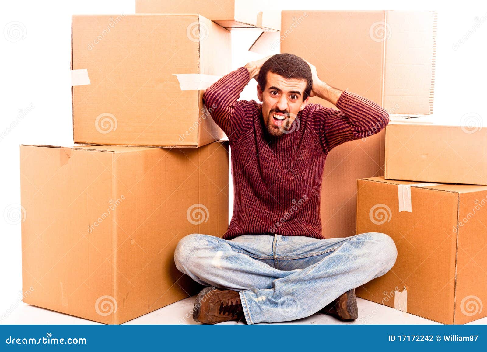 Stressed Man between Boxes stock photo. Image of head - 17172242