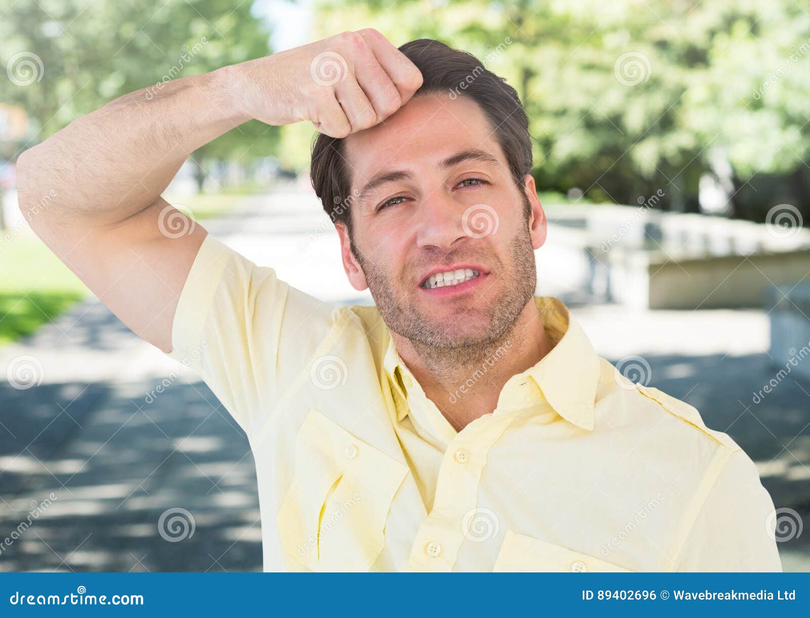 Stressed man in park stock photo. Image of painful, hand - 89402696