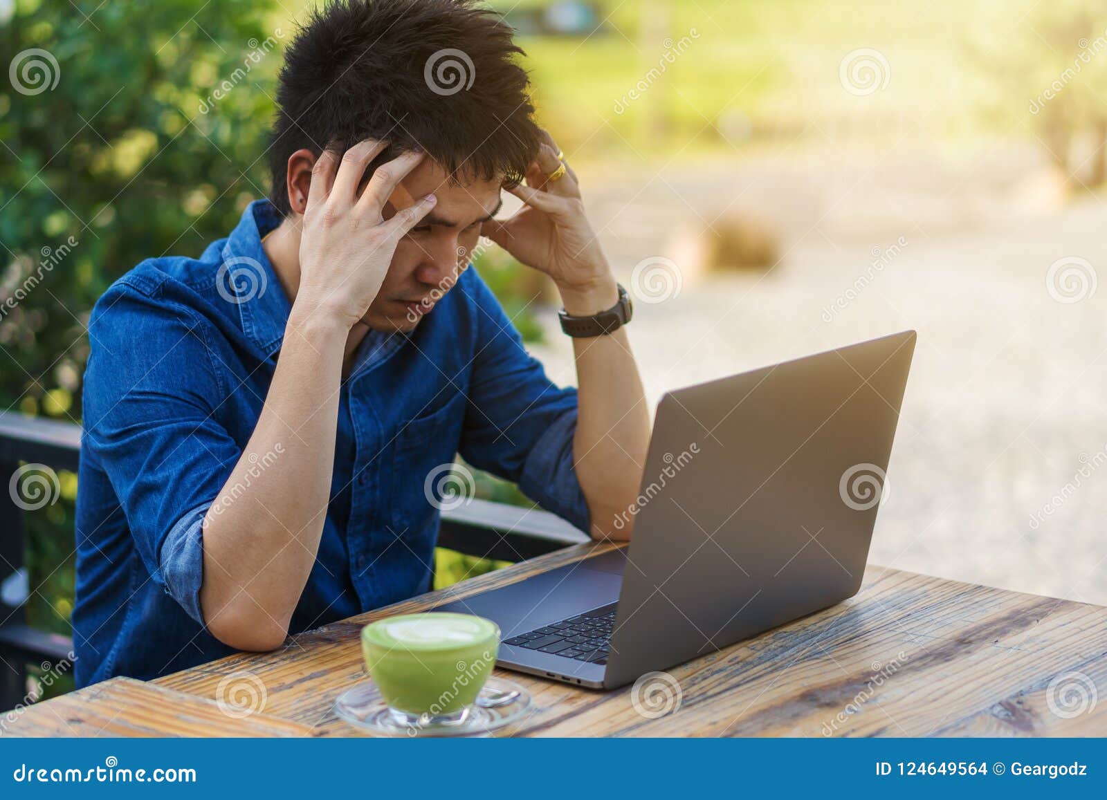 Stressed Man Using Laptop Computer Stock Photo - Image of face, garden ...