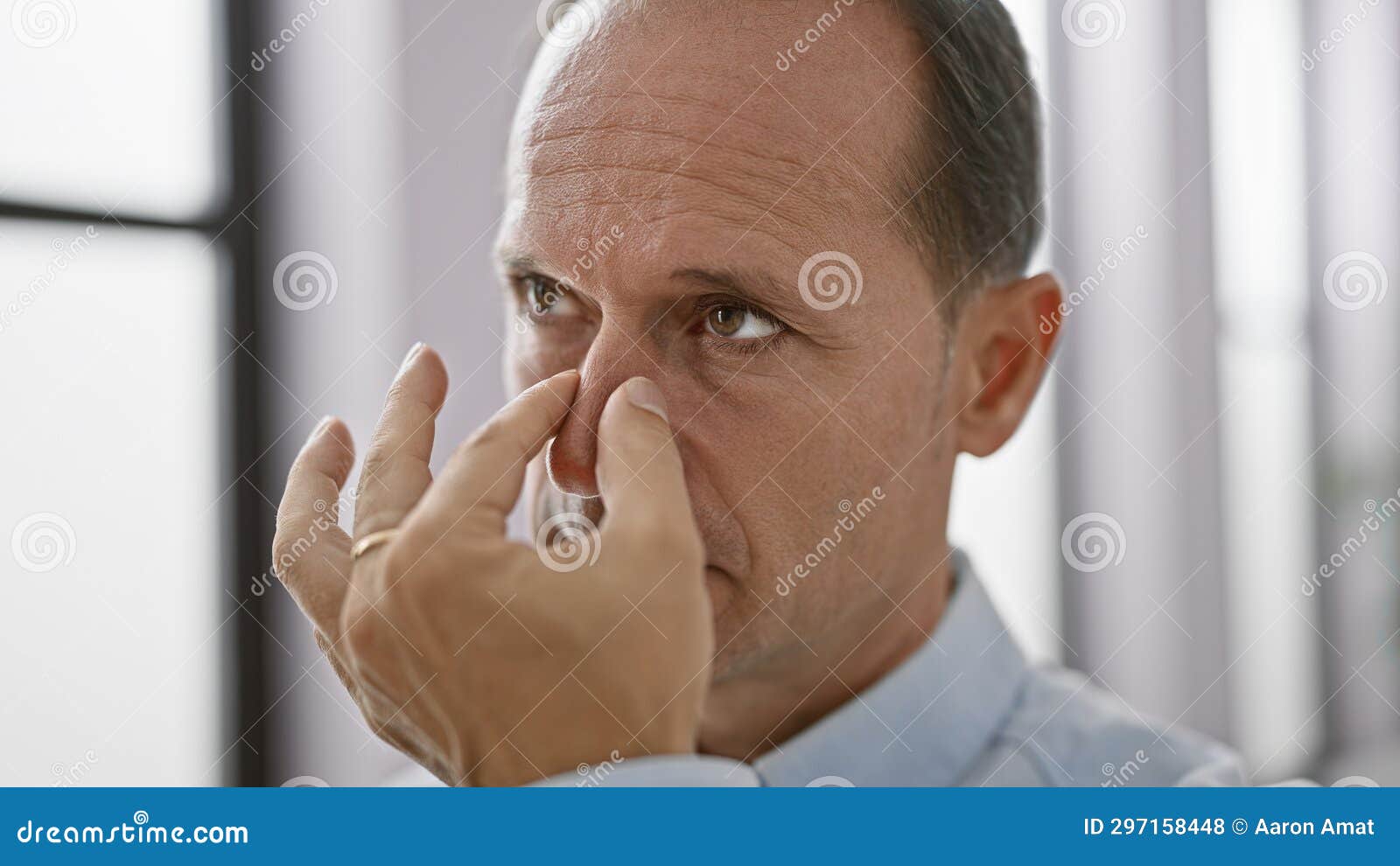 Stressed Middle Age Man Standing Alone at Home, Grappling with ...