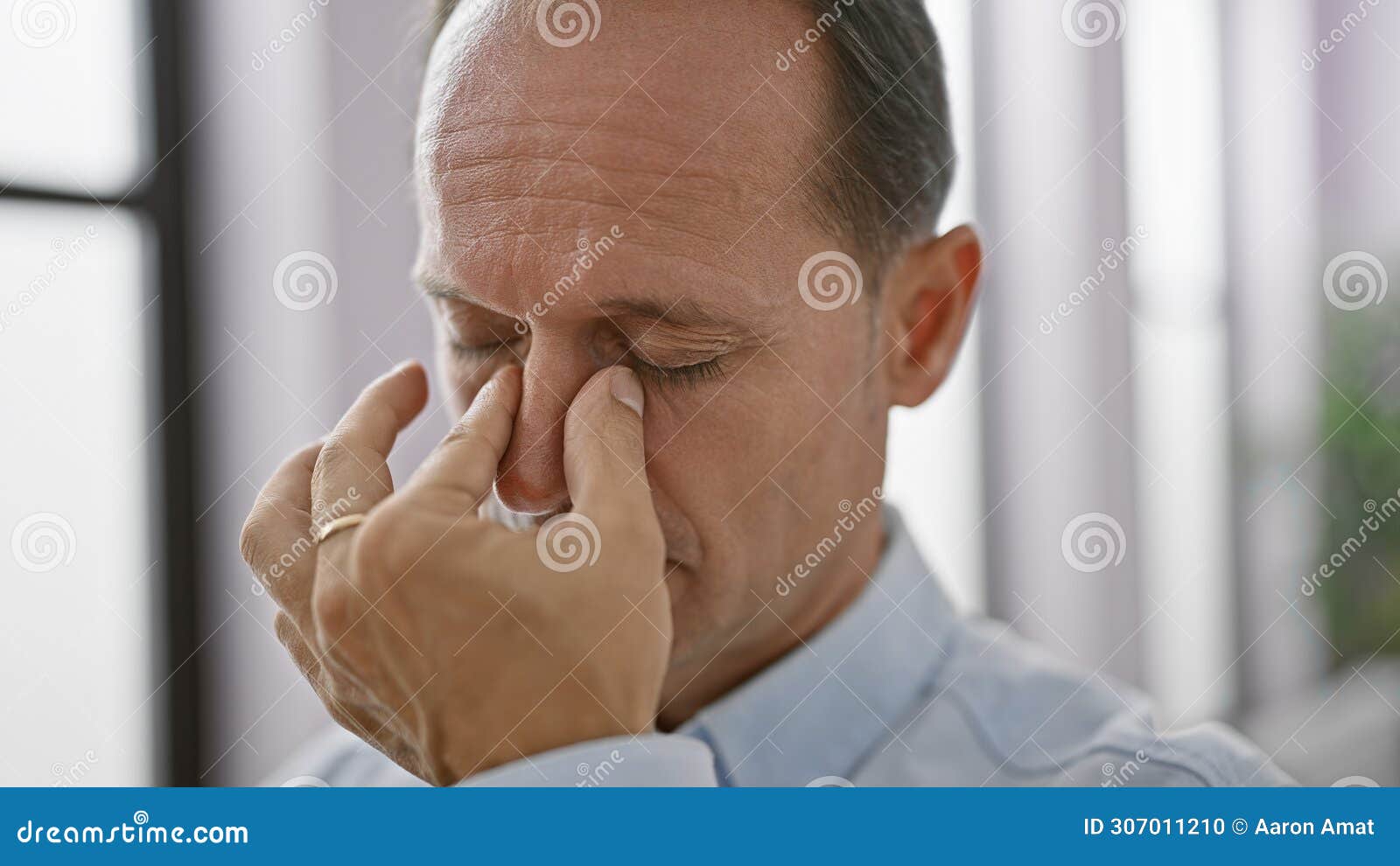 Stressed Middle Age Man Standing Alone at Home, Grappling with ...