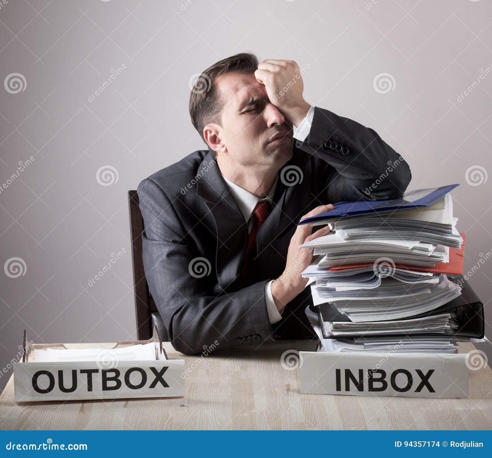 Stressed Office Worker with a Paper Stack Stock Photo - Image of inbox ...