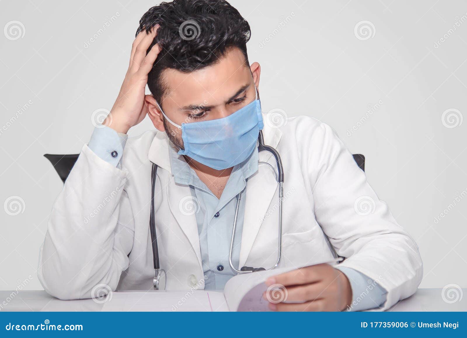 Doctor reading note stock photo. Image of book, health - 177359006