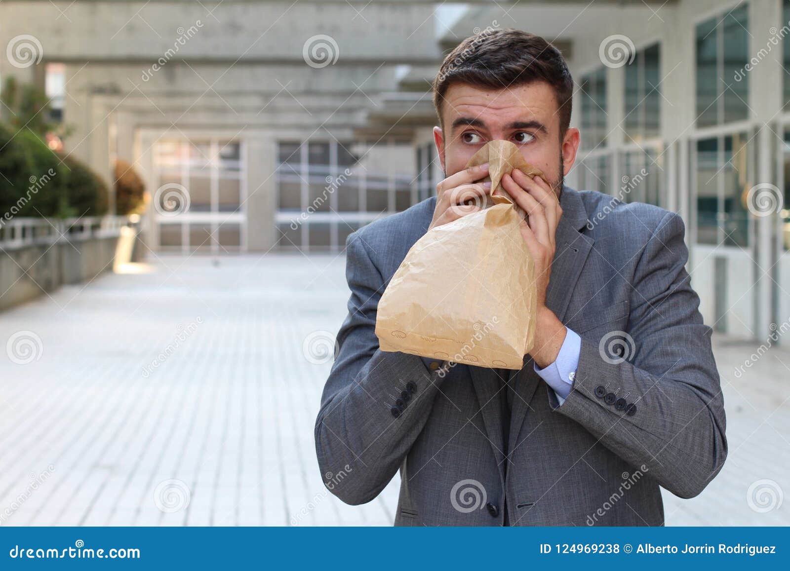 Stressed Out Man Breathing through Paper Bag Stock Photo - Image of ...