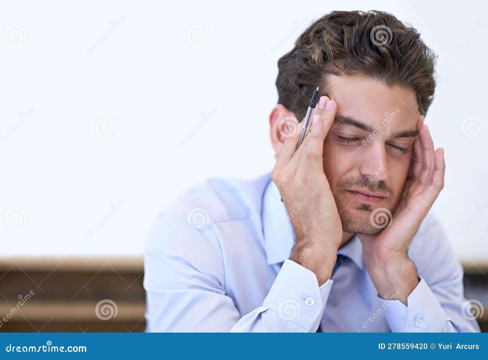 Stressed Out and in Pain. a Stressed-out Businessman with a Pained ...